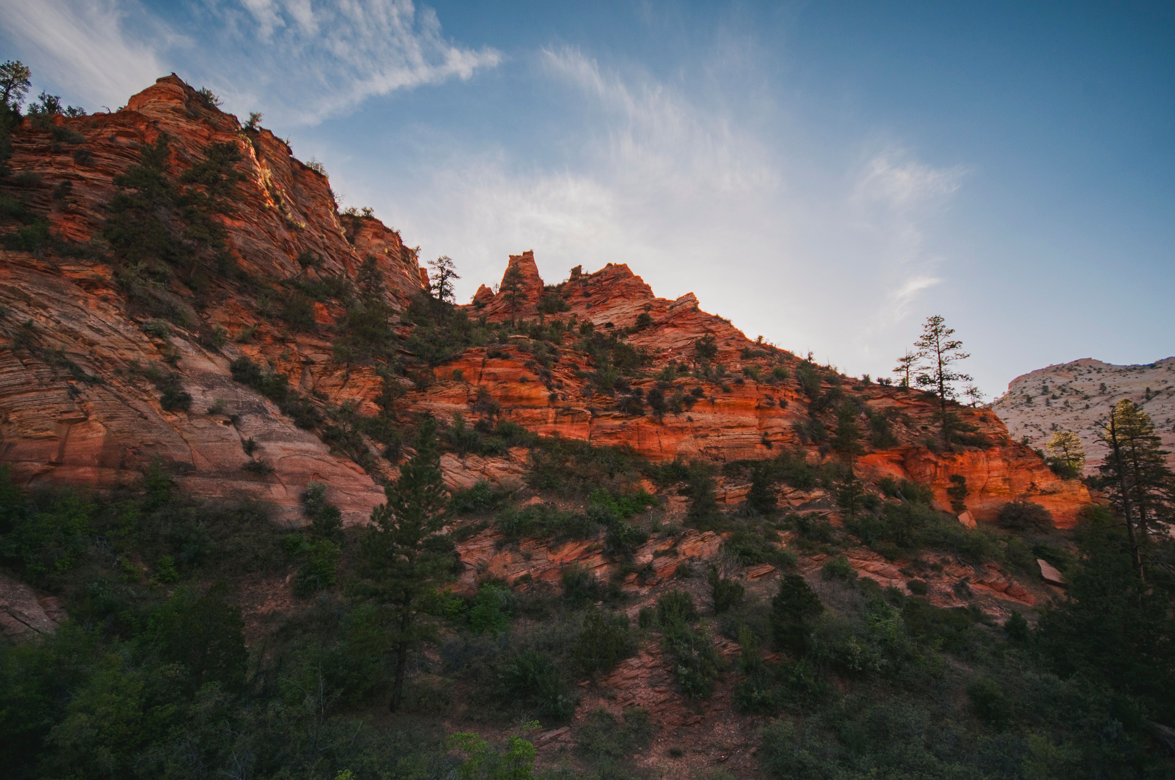 Majestic Red Rock Cliff Under Blue Sky at Zion · Free Stock Photo