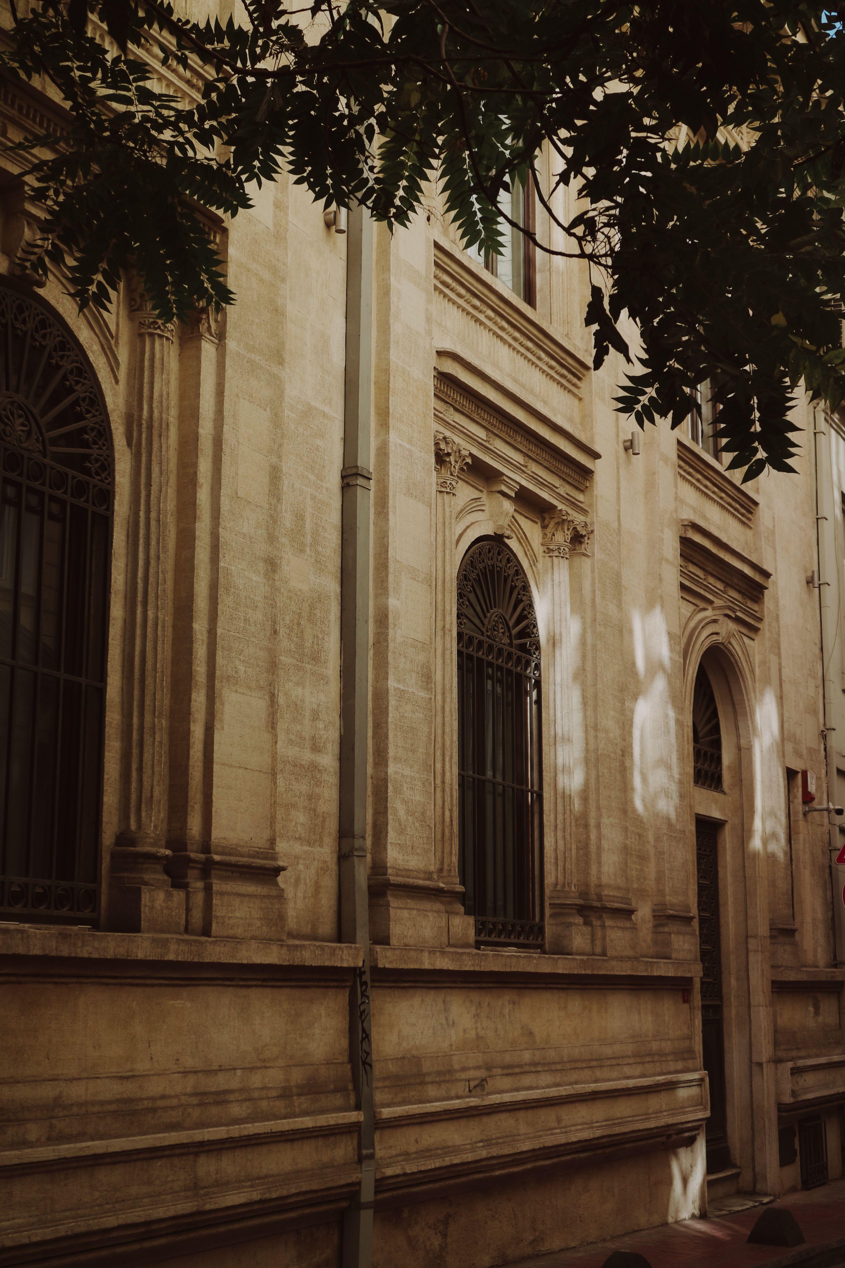 Historic European Architecture with Arched Windows · Free Stock Photo