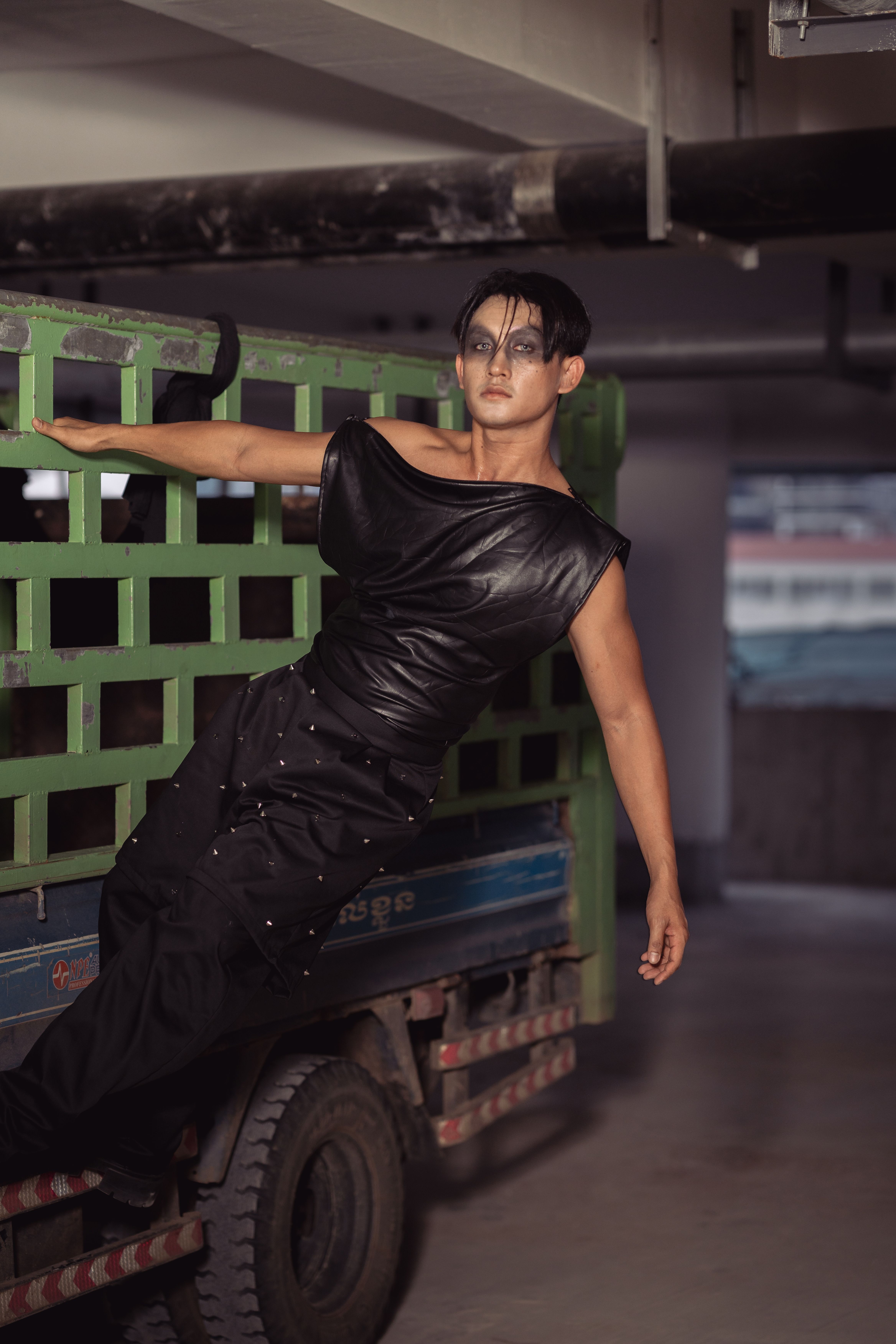 Creative Fashion Pose in Urban Setting · Free Stock Photo