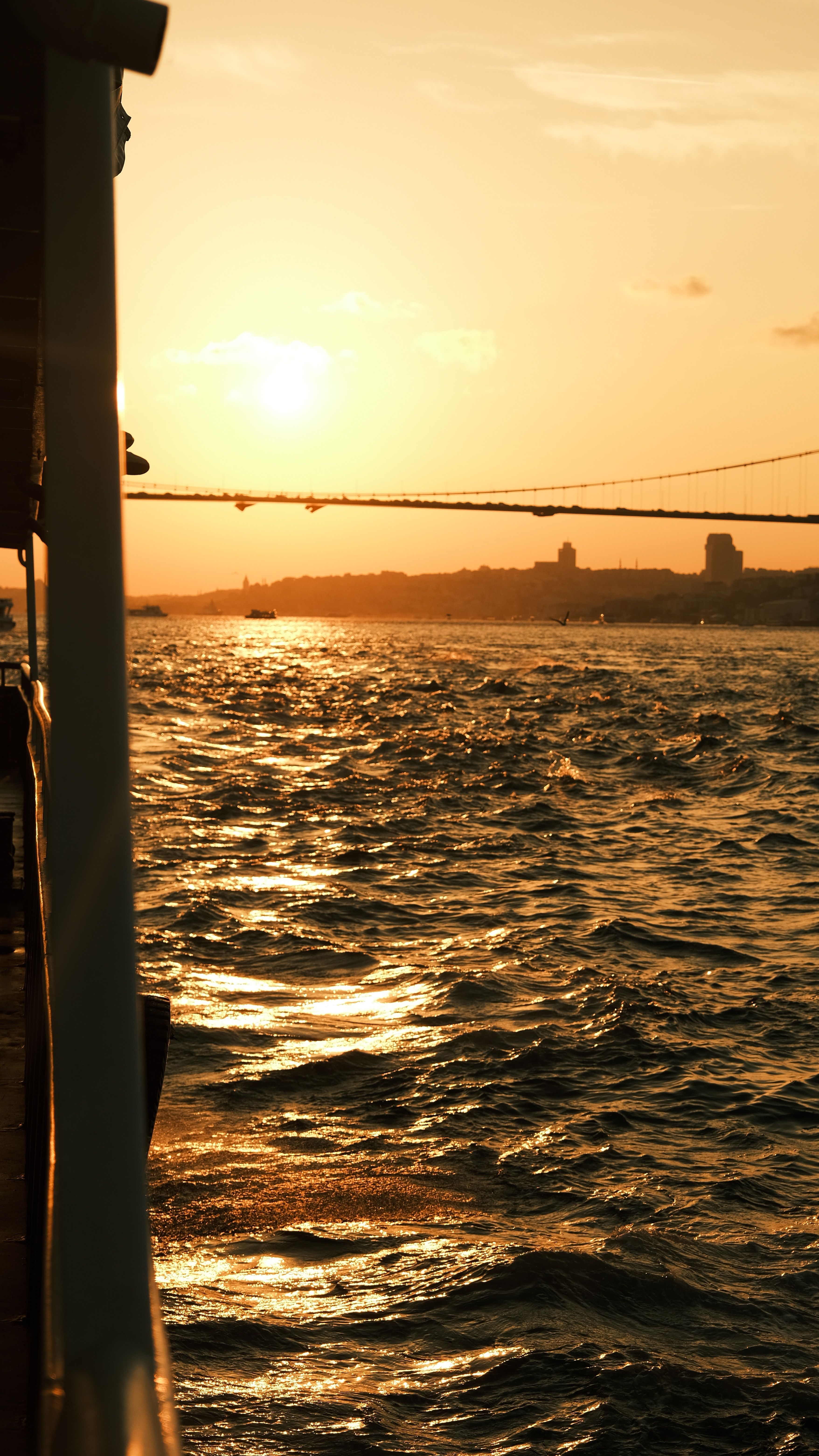 Sunset View from a Boat with Water Reflections · Free Stock Photo
