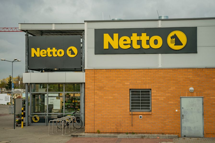 Who owns tesco plc and how do its shareholders benefit?