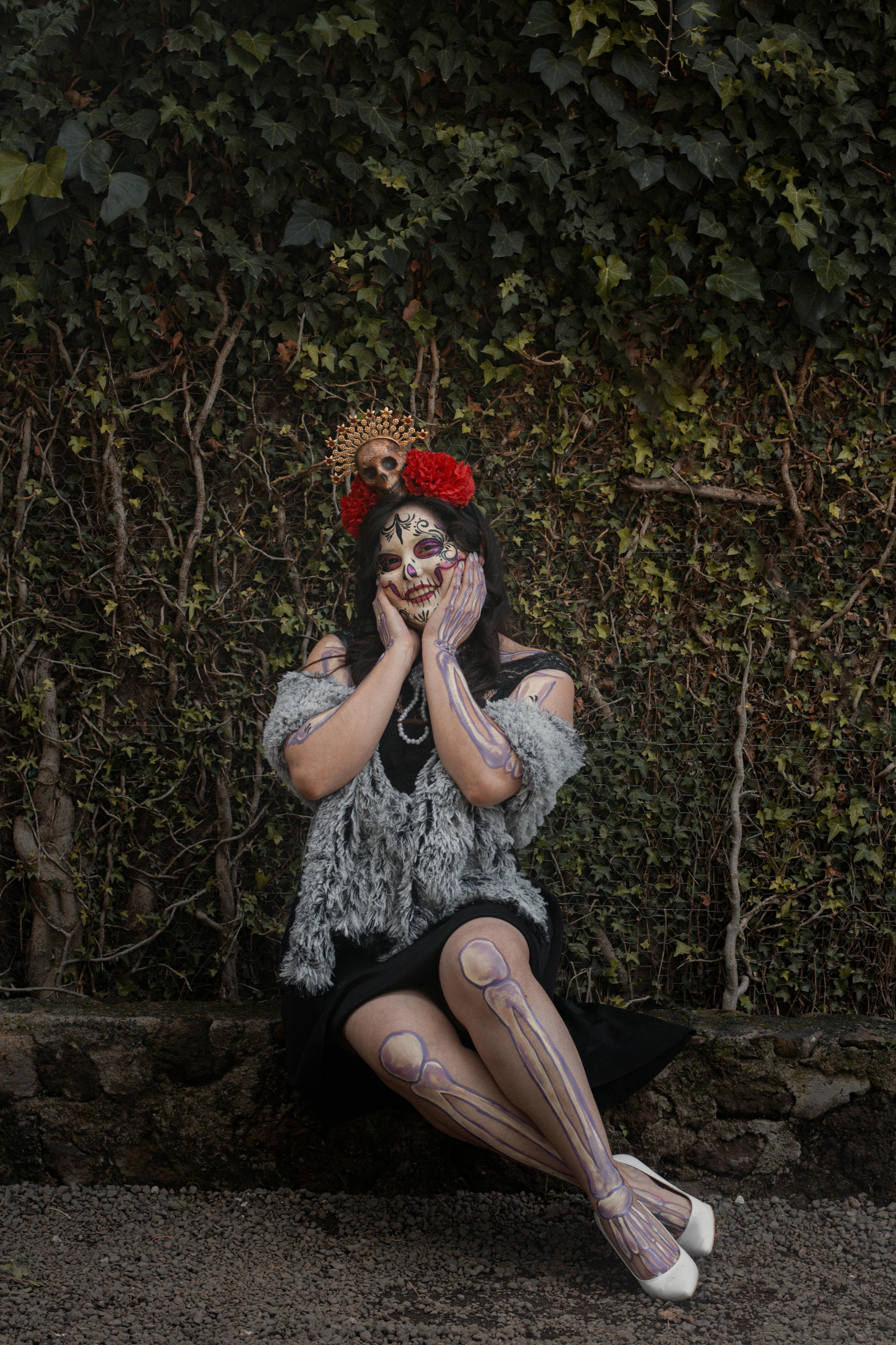 Day of the Dead Catrina Sitting Outdoors · Free Stock Photo
