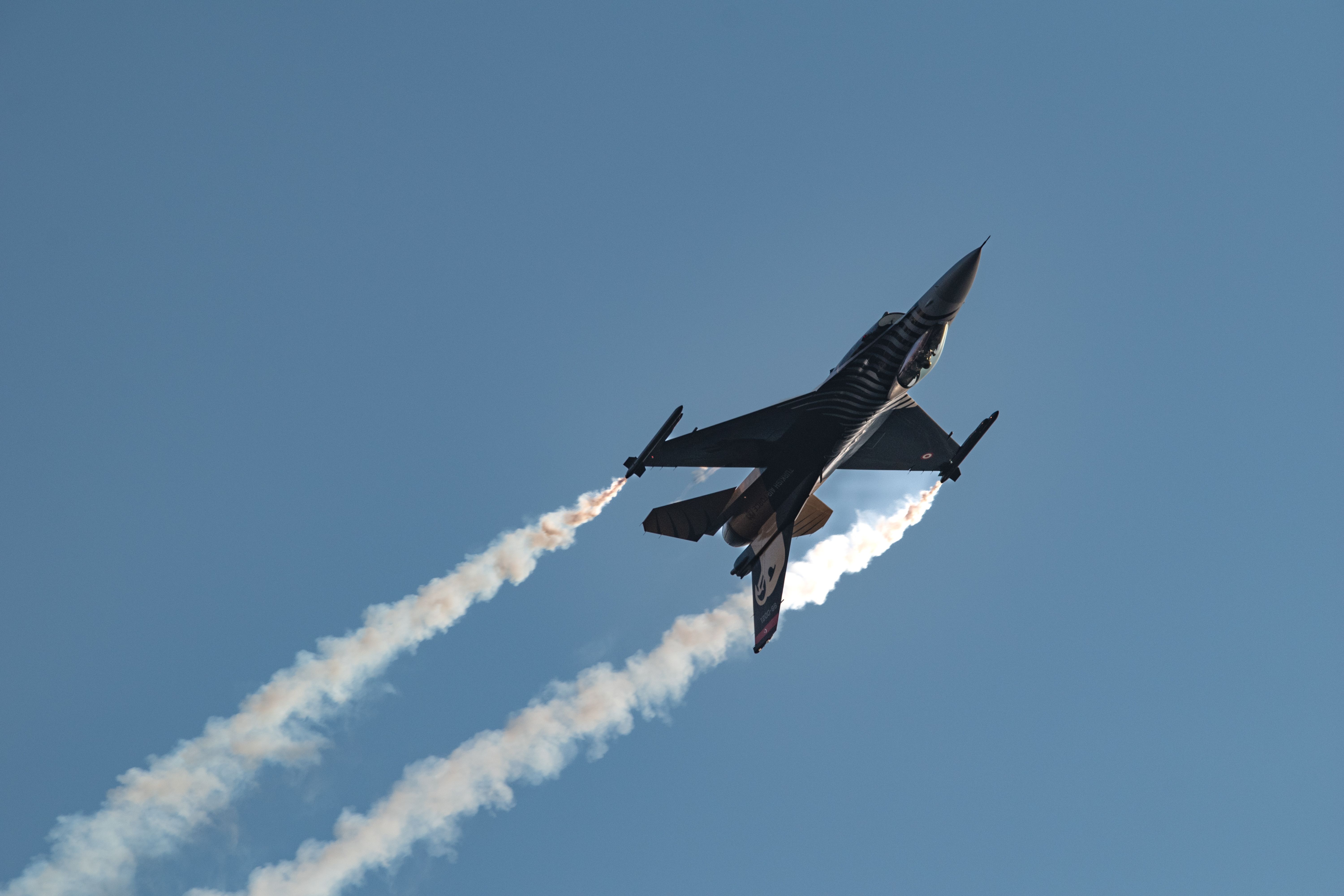 Jet Fighter Performing Aerial Acrobatics with Smoke Trails · Free Stock ...
