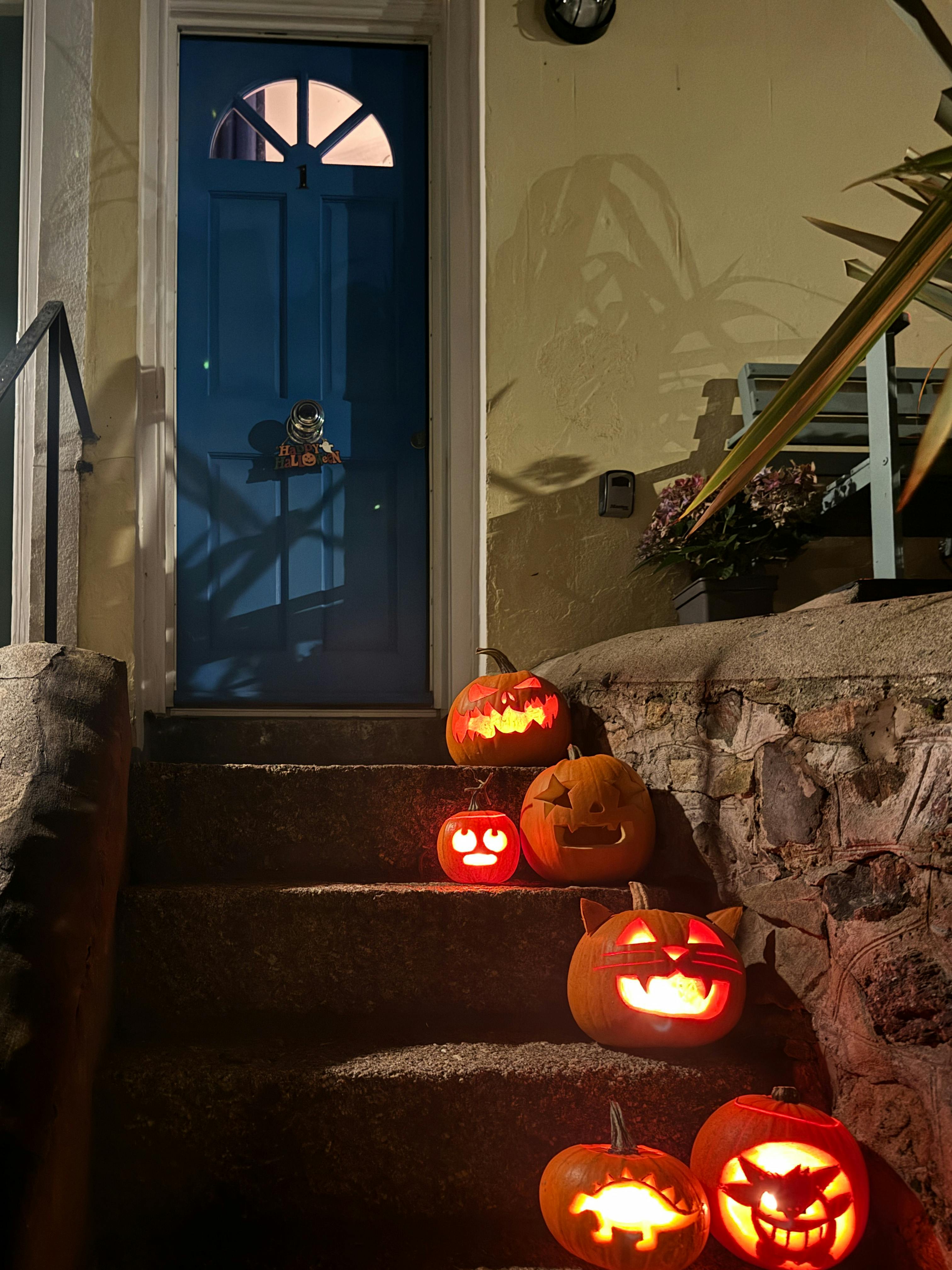 Spooky Halloween Pumpkin Display at Night · Free Stock Photo