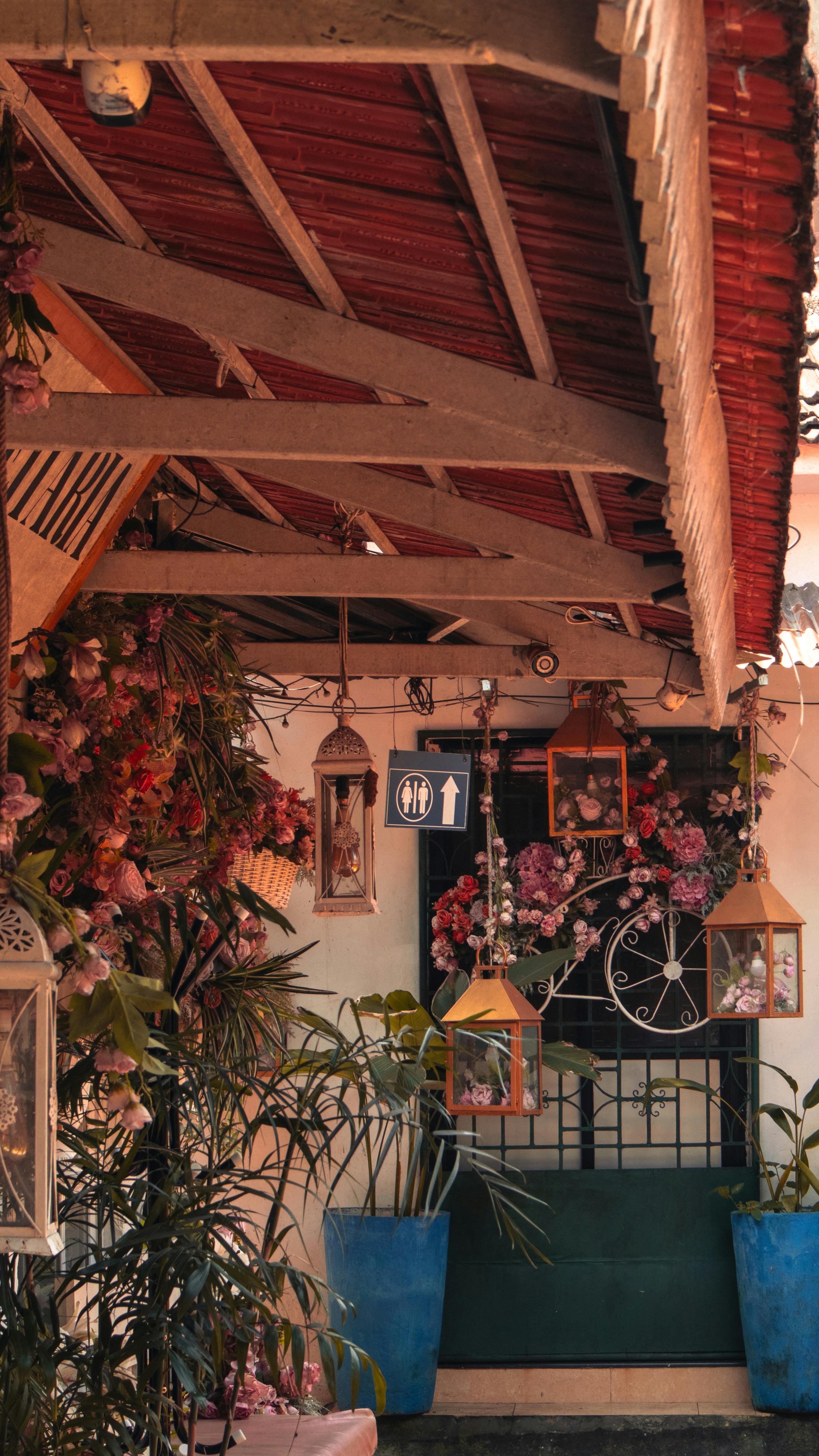 Charming Floral Decorated Outdoor Passage · Free Stock Photo