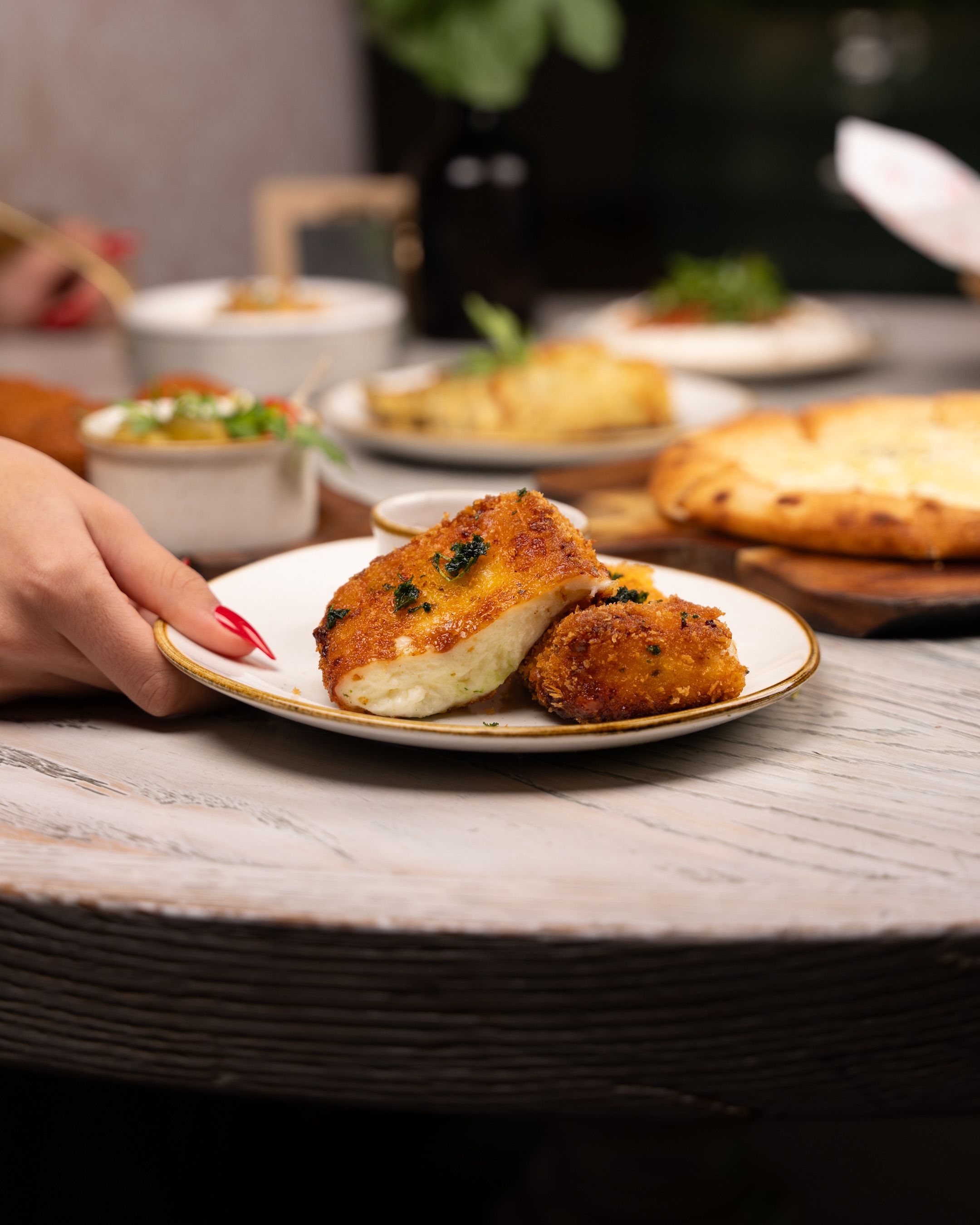 Gourmet Fried Appetizer on Elegant Dinner Table · Free Stock Photo