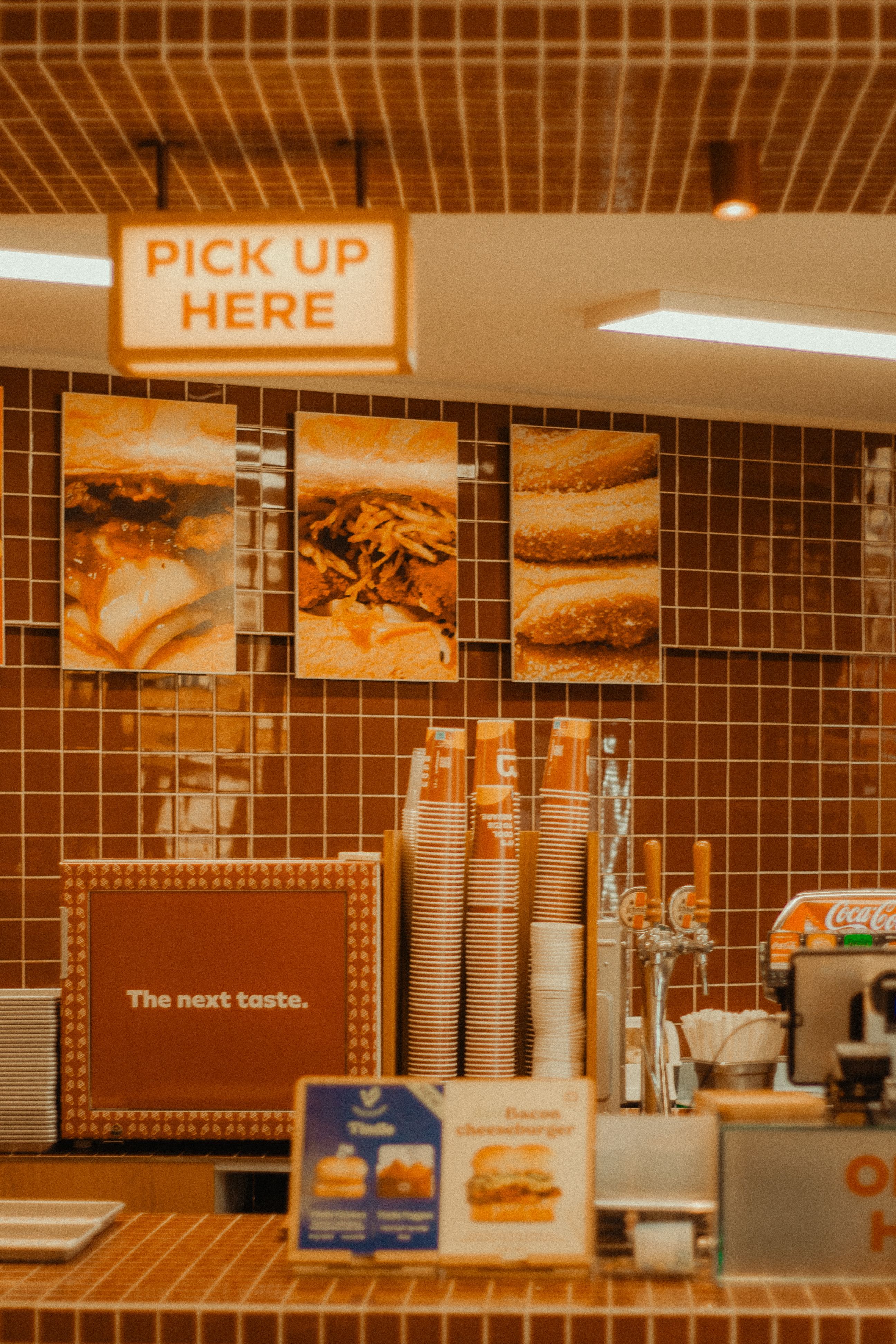 Fast Food Counter With Pick Up Sign · Free Stock Photo