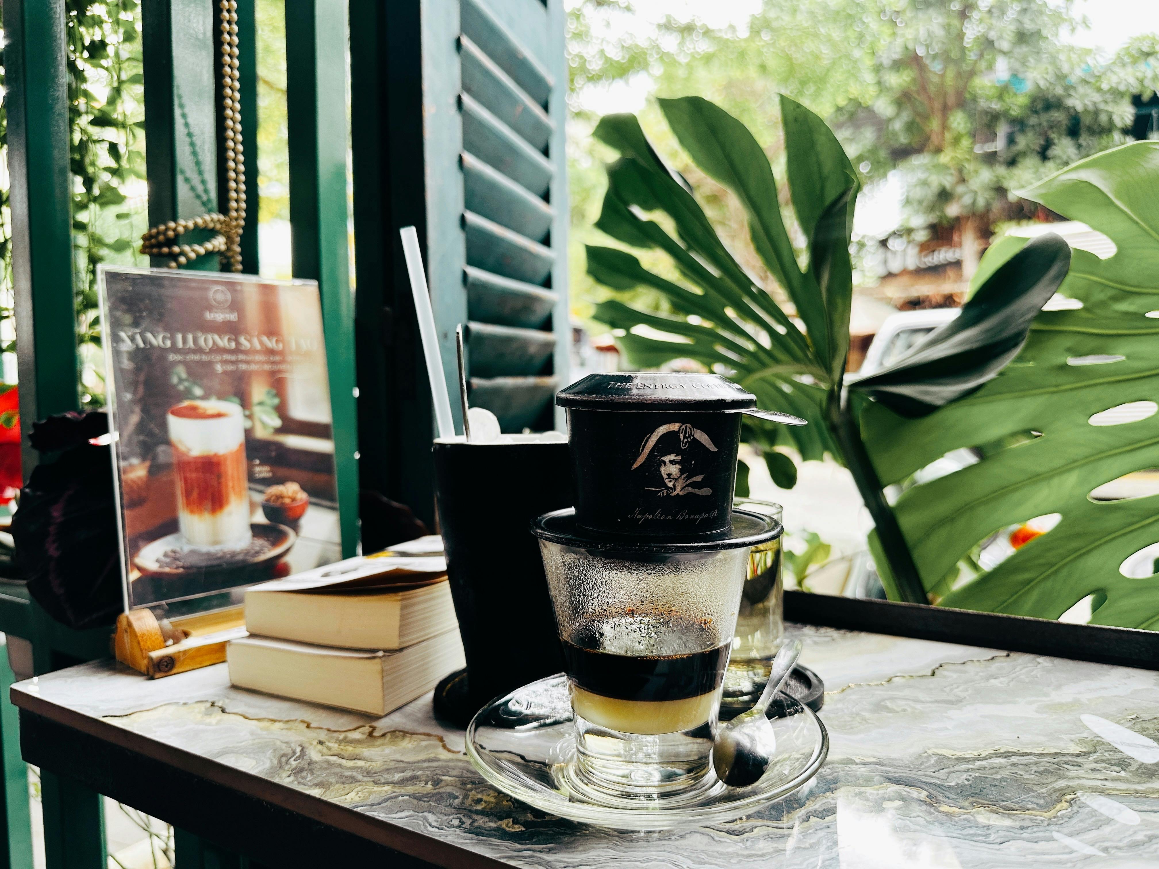 Vietnamese Coffee with Phin Filter on a Café Table · Free Stock Photo