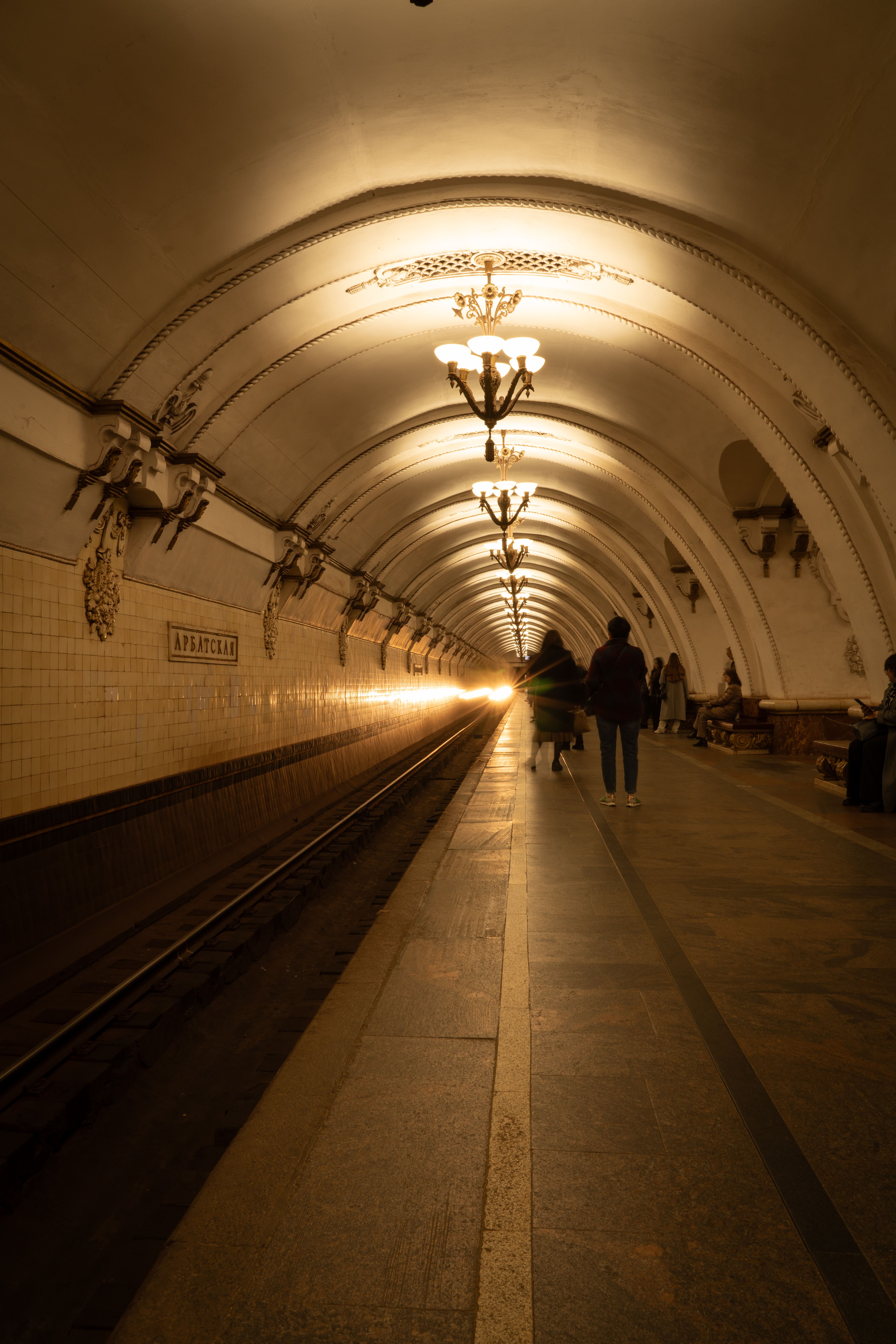 Elegant Underground Metro Station with Passengers · Free Stock Photo
