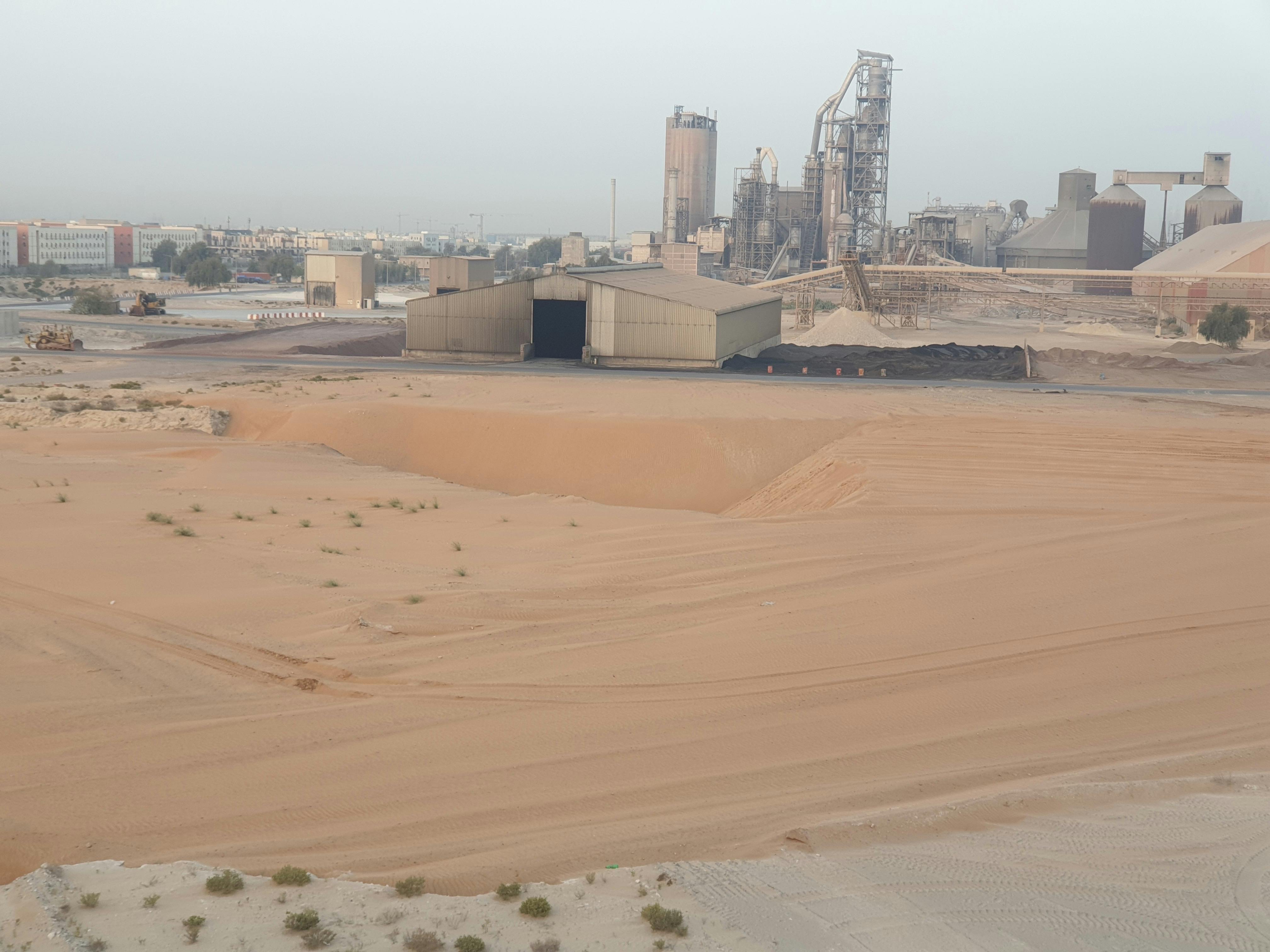 Industrial Facility in Desert Landscape · Free Stock Photo