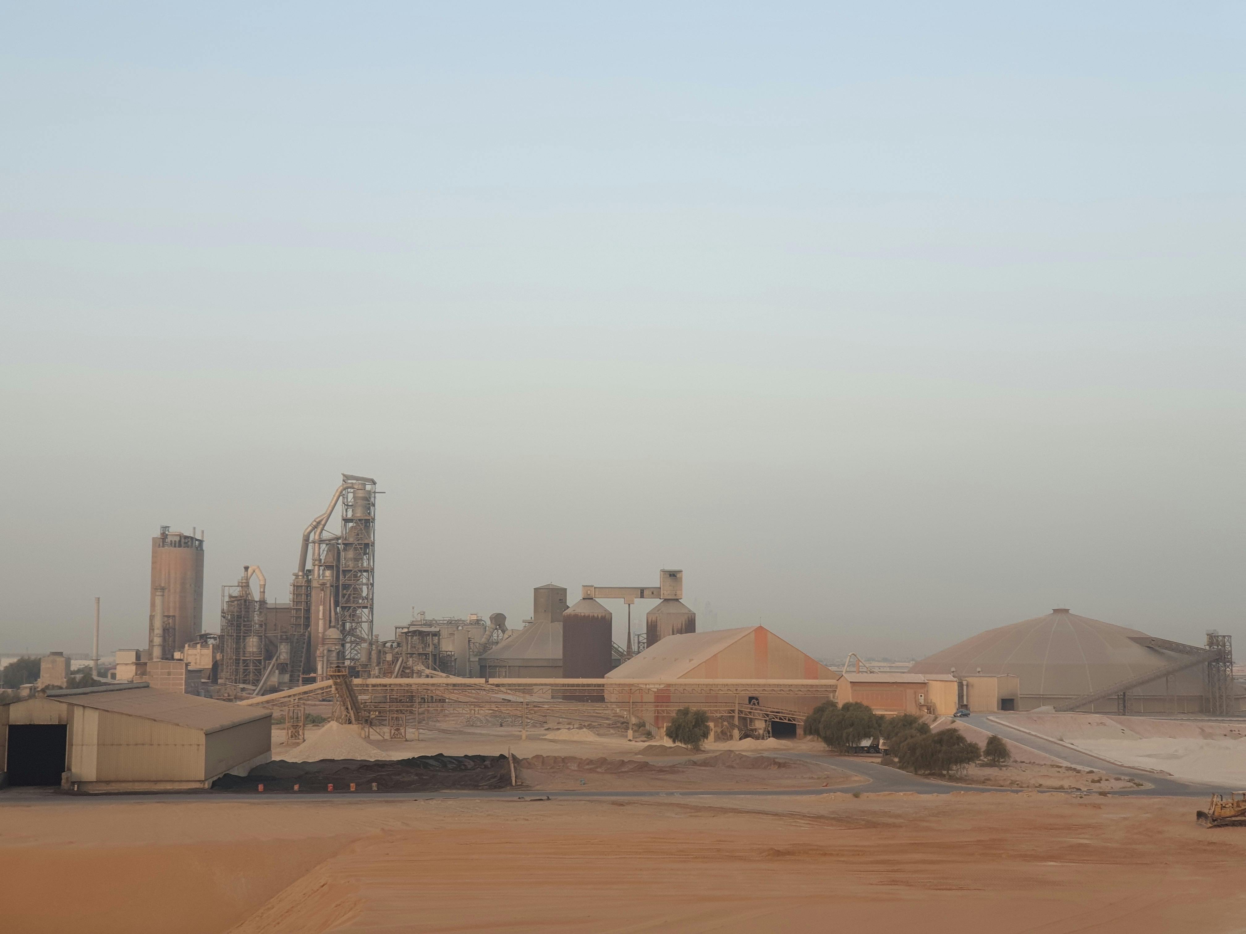 Industrial Landscape with Factory Buildings · Free Stock Photo