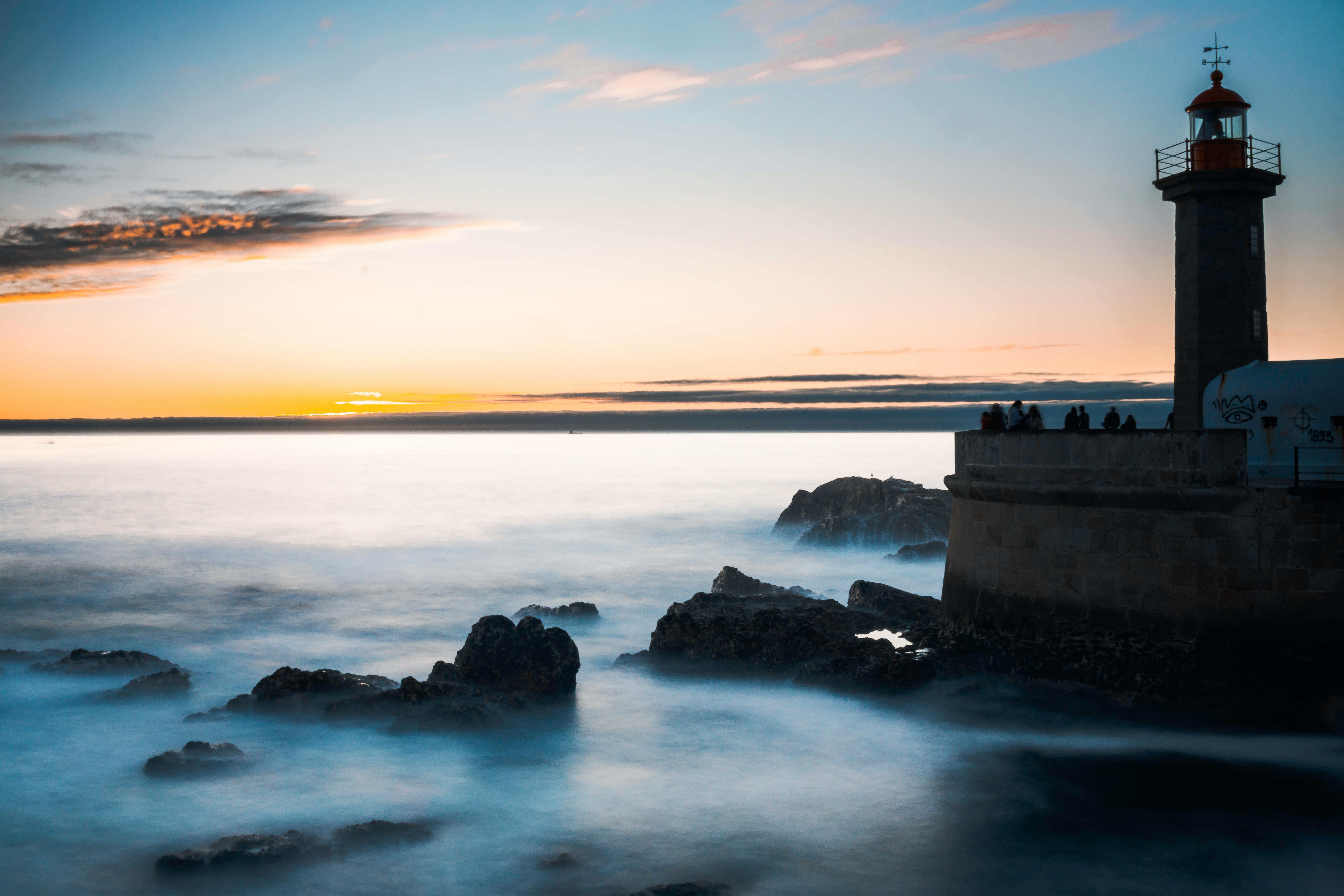 Serene Sunset at Porto Lighthouse in Portugal · Free Stock Photo