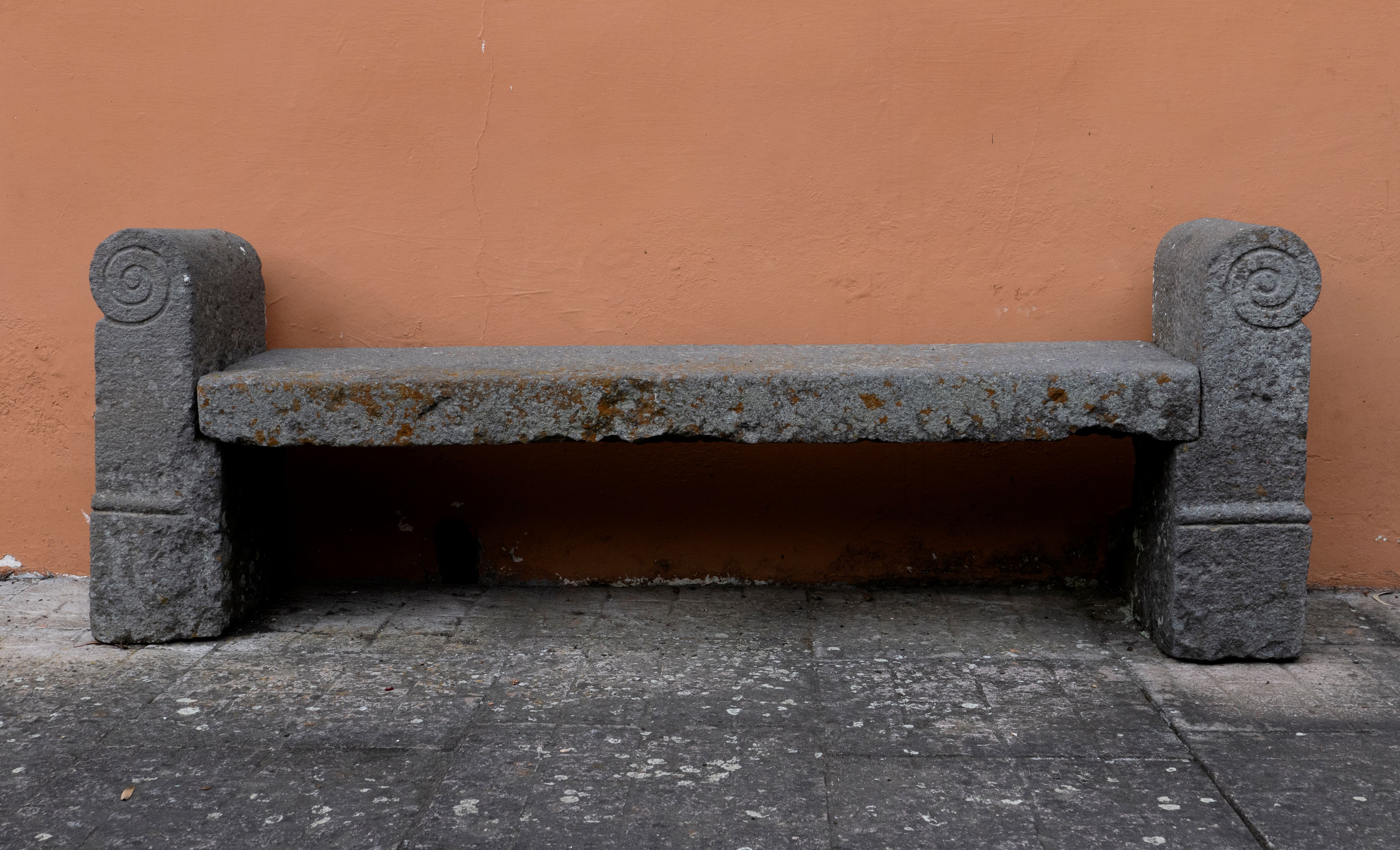 Stone Bench Against Peach Wall in Quito · Free Stock Photo