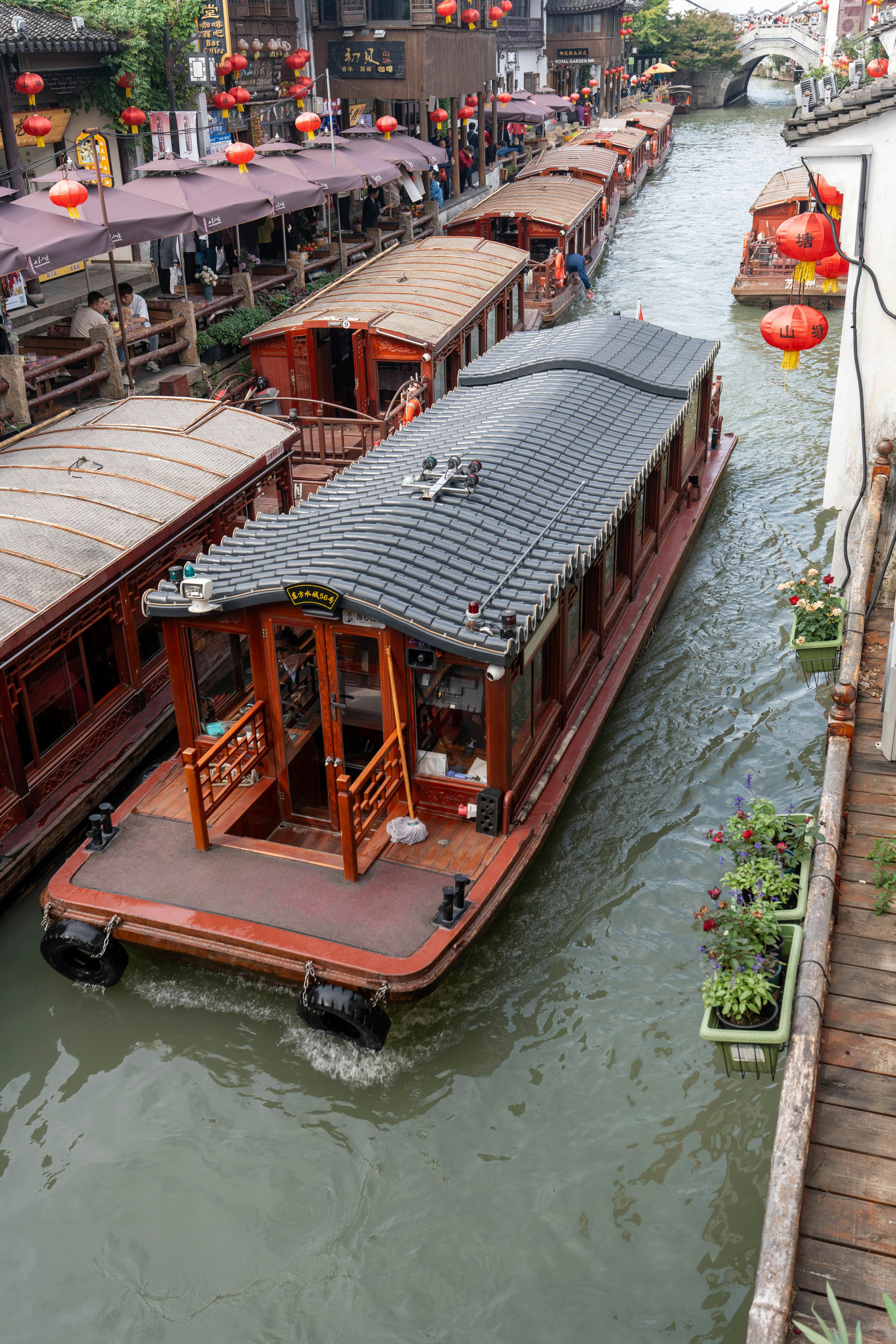 Traditional Chinese Boat on Water Canal · Free Stock Photo