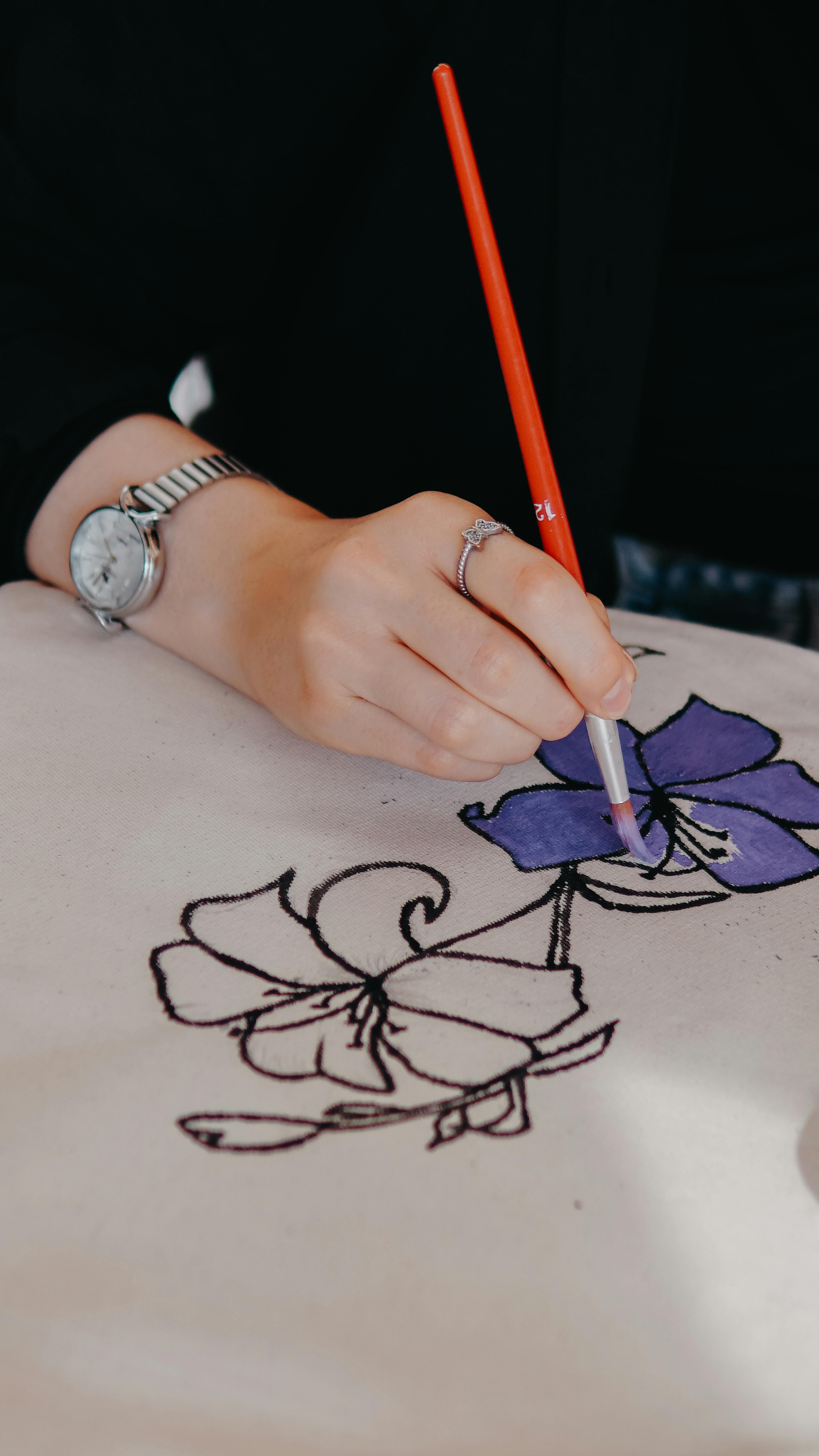 Artistic Hand Painting Floral Design on Fabric · Free Stock Photo