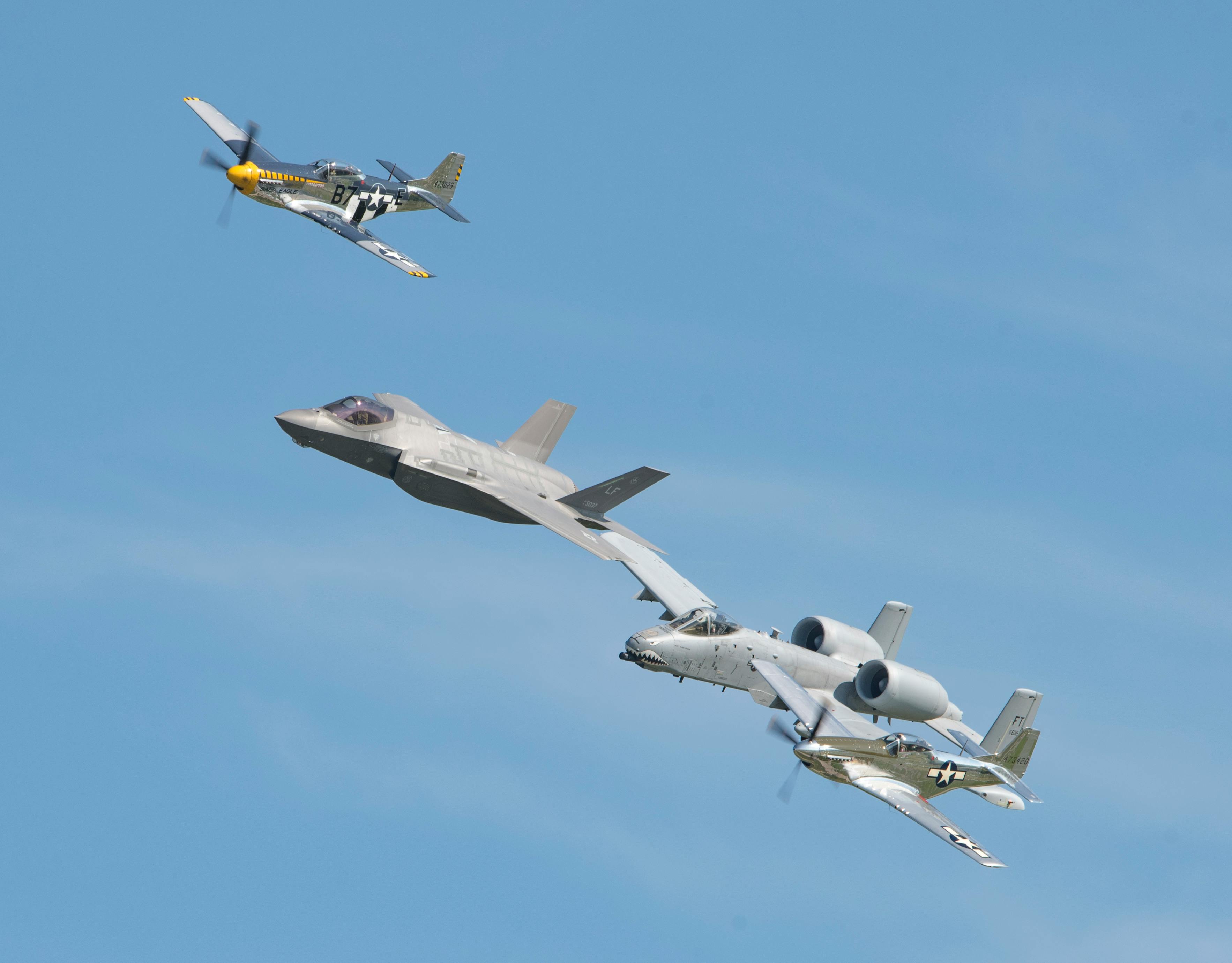 Diverse Military Fighter Aircraft Formation Flight · Free Stock Photo