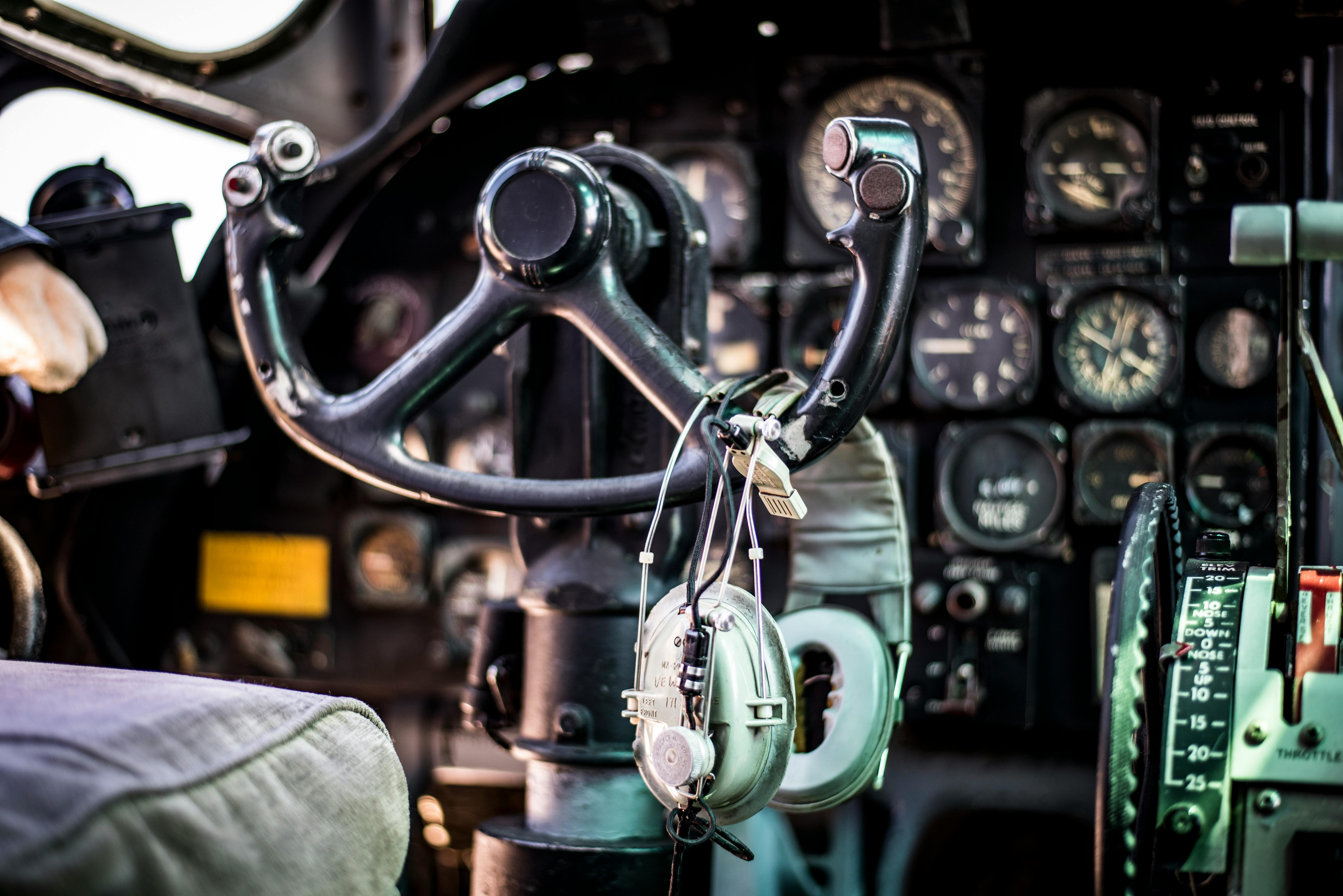 Vintage Aircraft Cockpit with Controls and Dials · Free Stock Photo