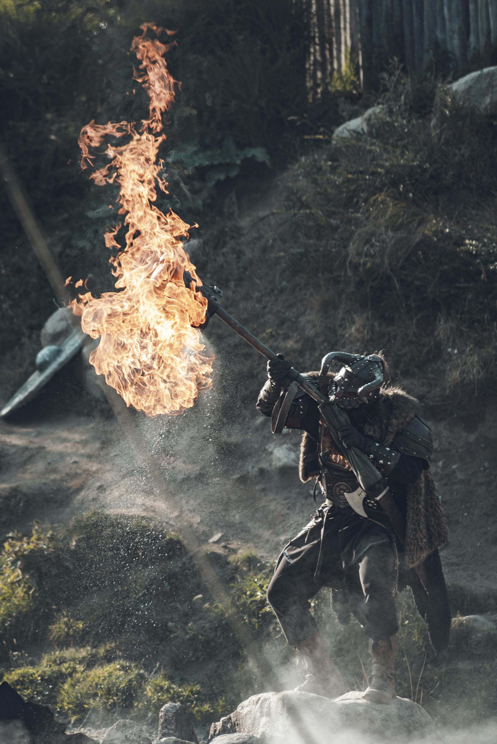 Viking Warrior With Fire Shooting Weapon in Forest · Free Stock Photo