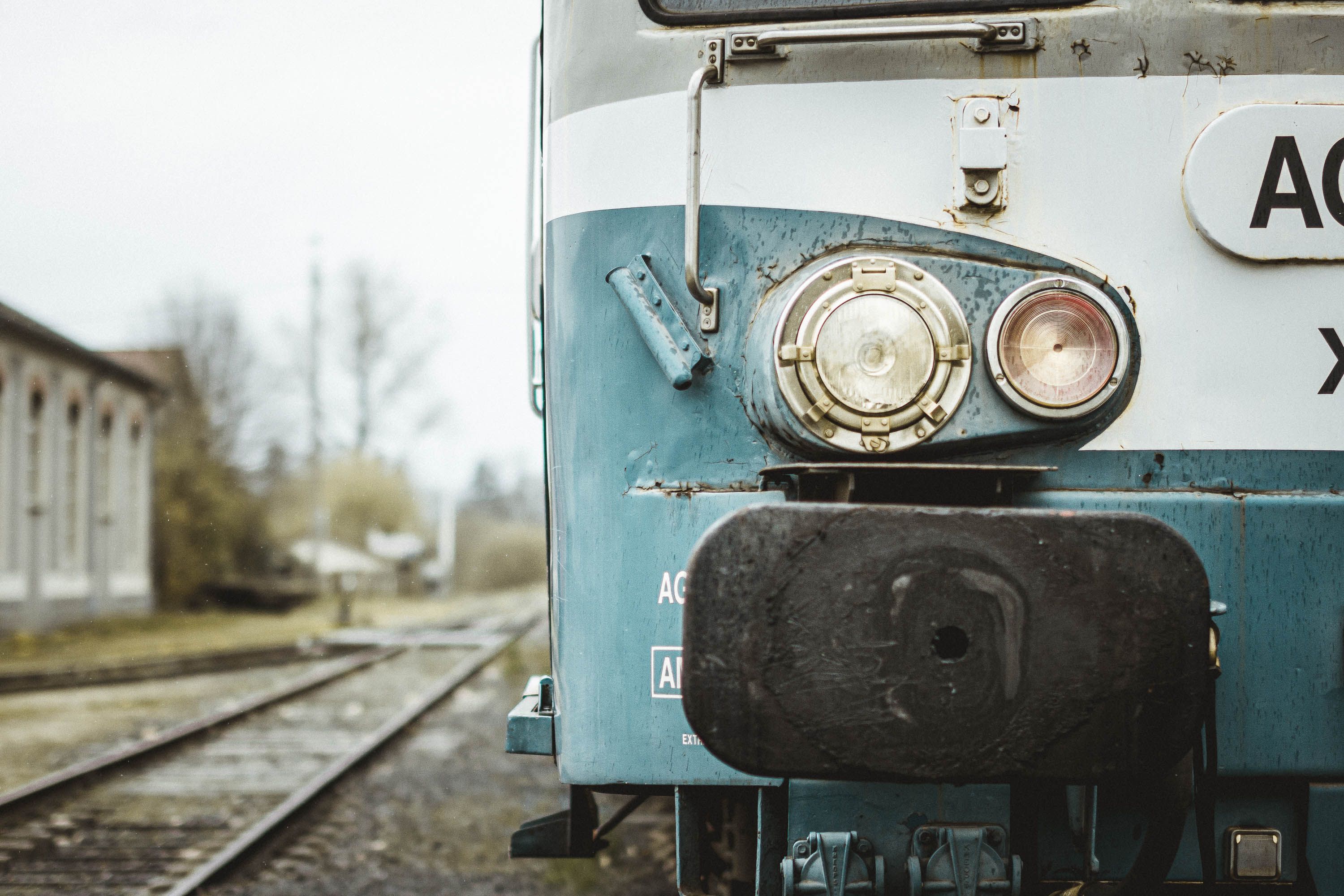 Close-up of Blue Train Locomotive on Track · Free Stock Photo