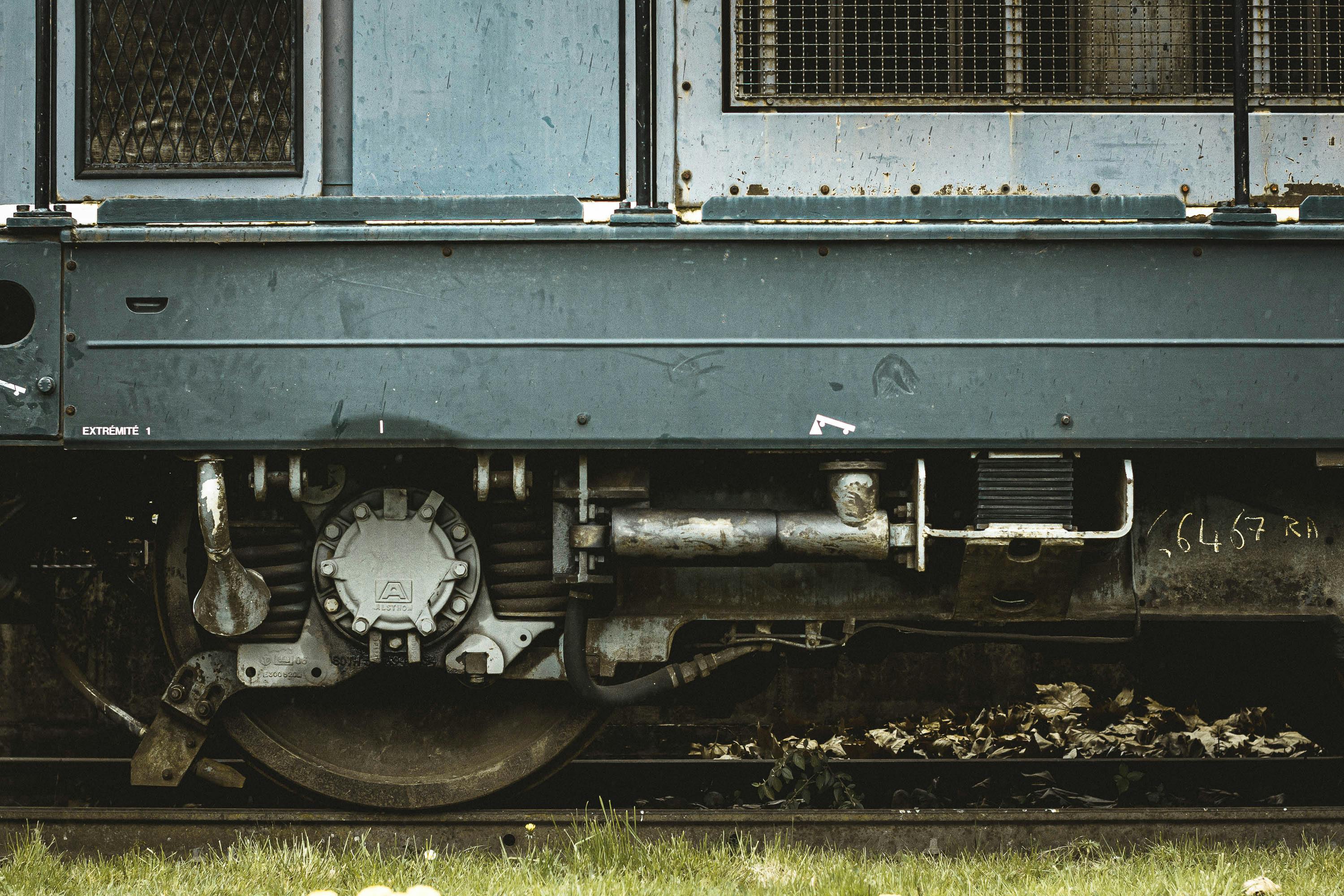 Close-up of a Vintage Train Wheel and Underframe · Free Stock Photo