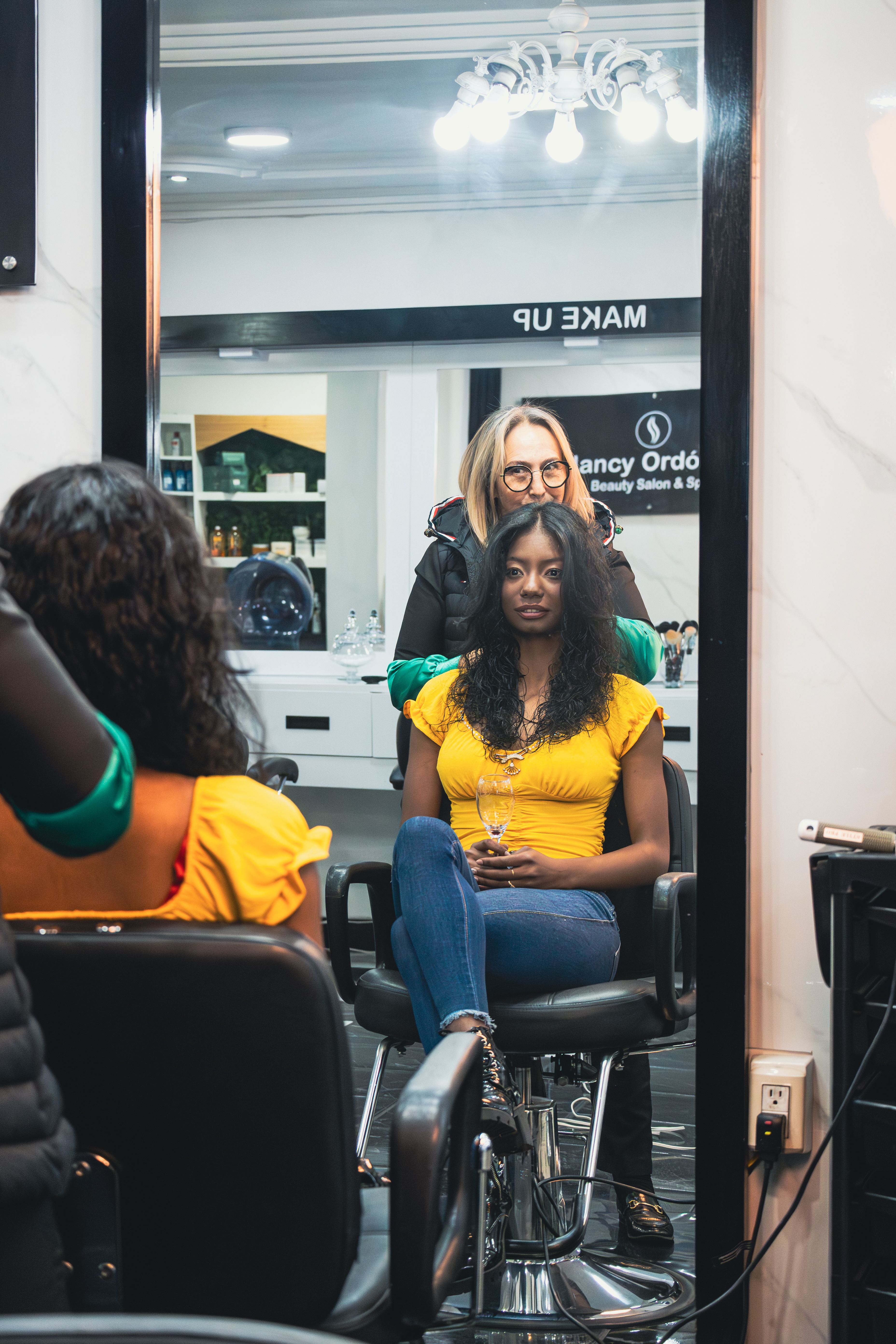 Woman Receiving Hair Treatment in Salon · Free Stock Photo