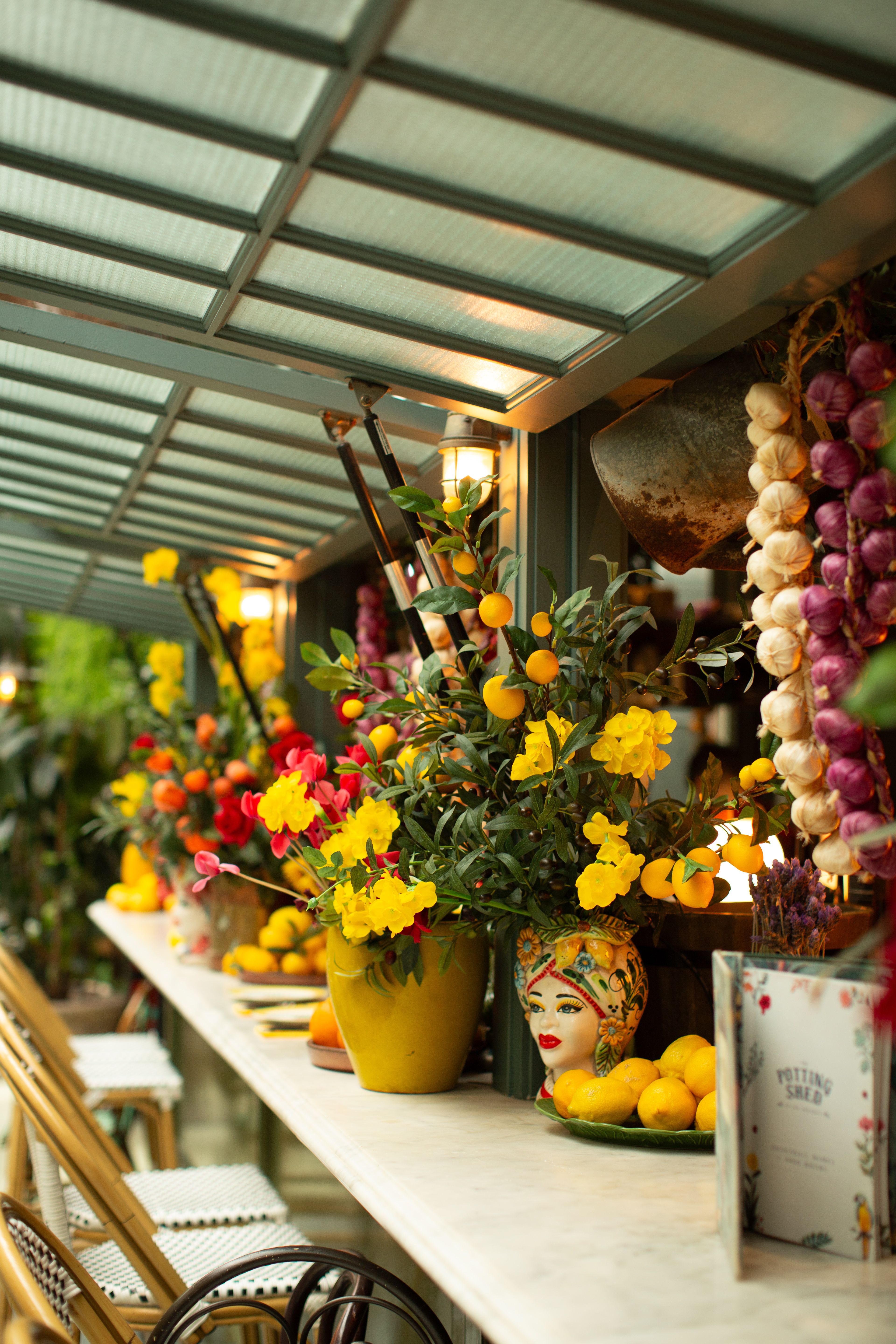 Vibrant Floral Display at Outdoor Café in Alexandria · Free Stock Photo