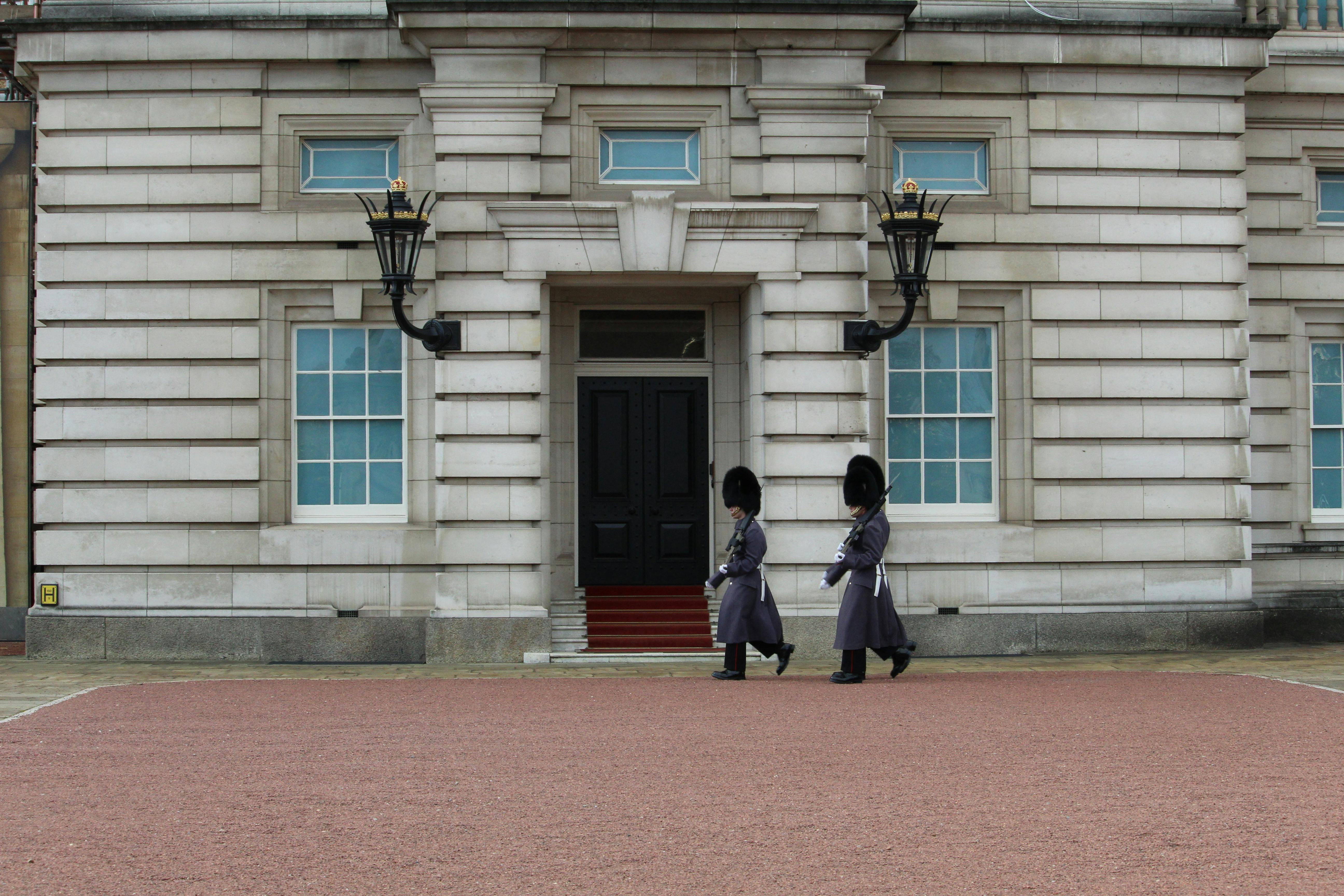 Royal Guards at Buckingham Palace Entrance · Free Stock Photo