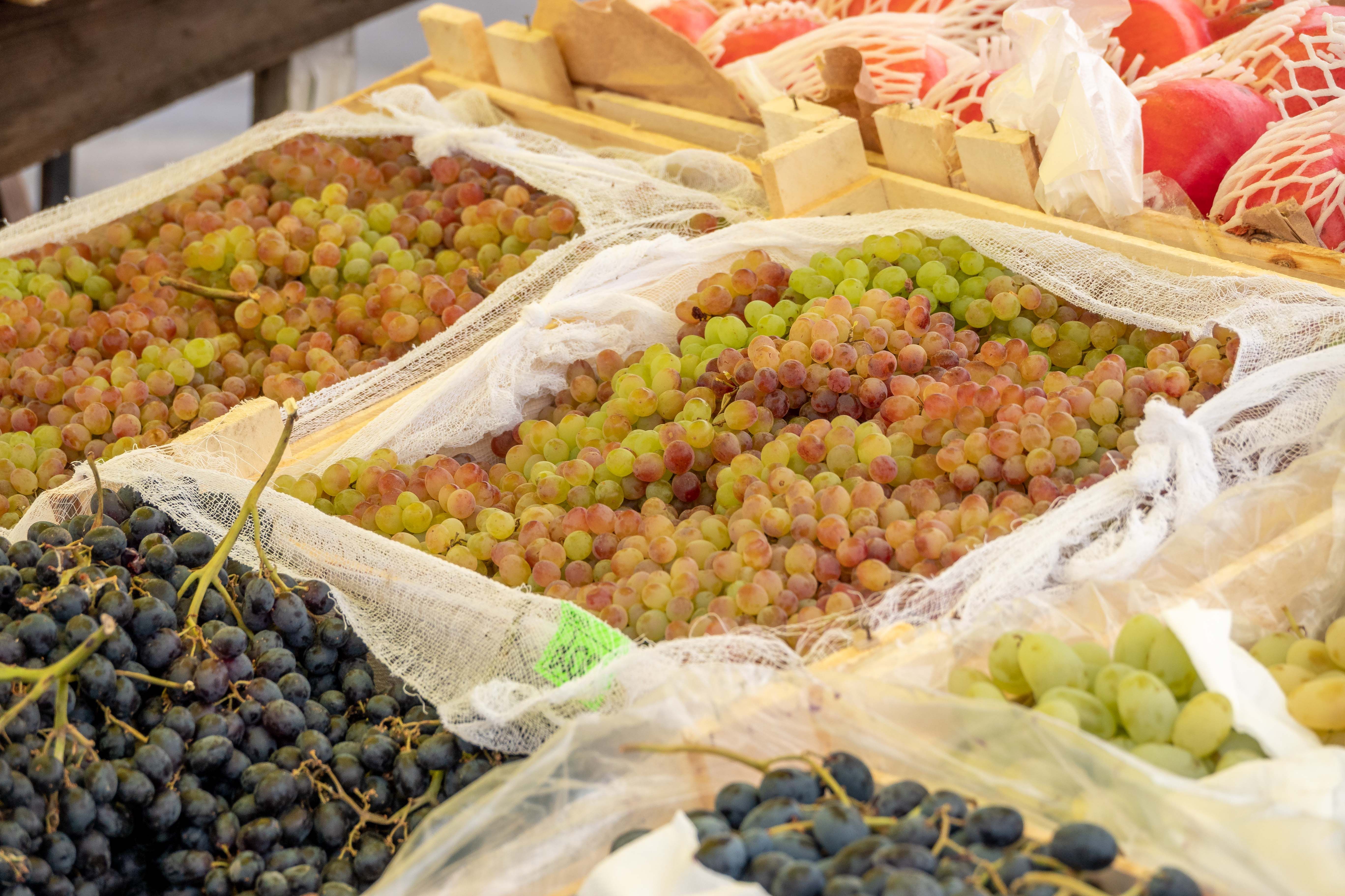 Fresh Grapes at a Local Market Stand · Free Stock Photo