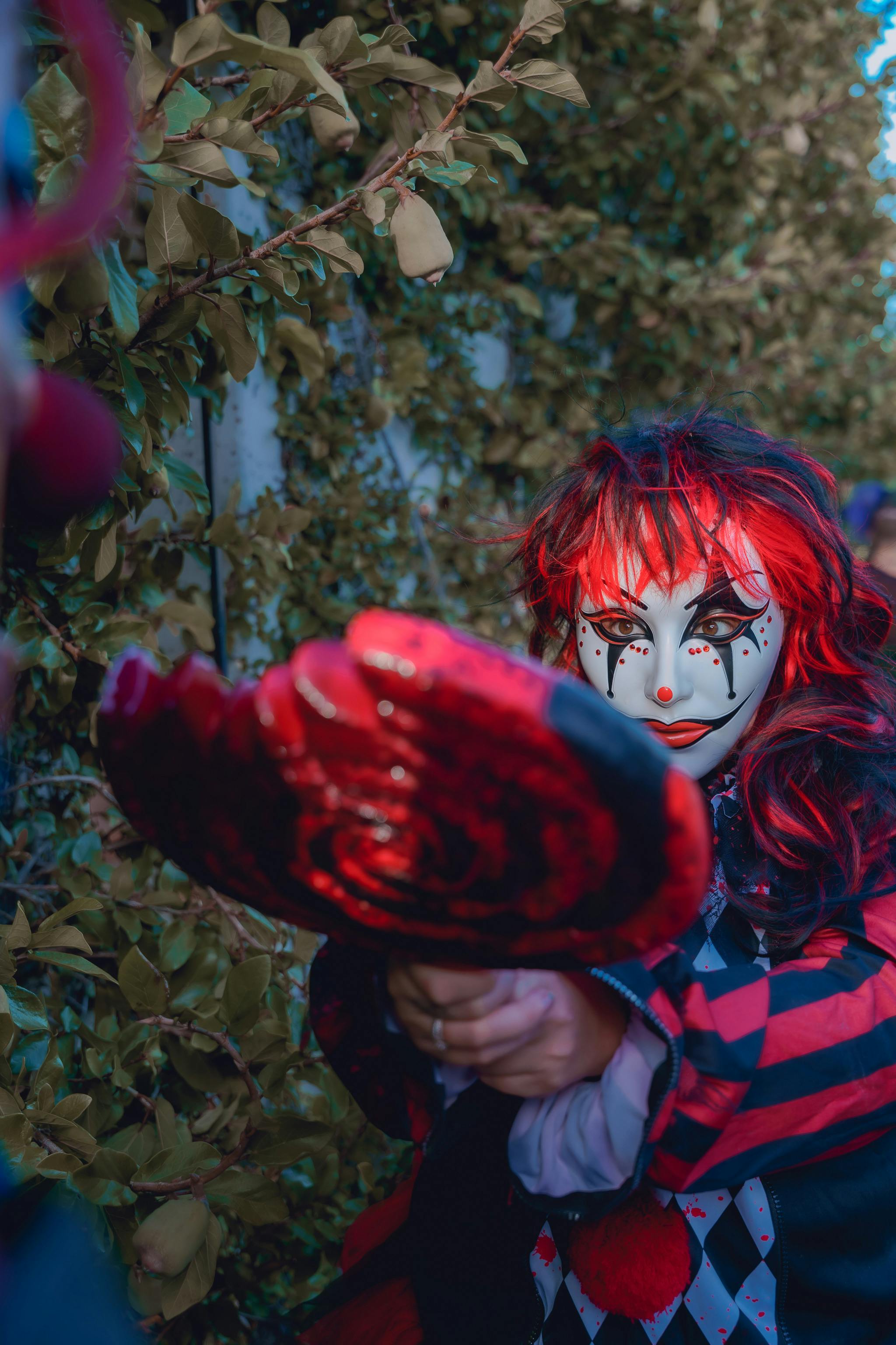Colorful Clown with Dramatic Makeup Outdoors · Free Stock Photo