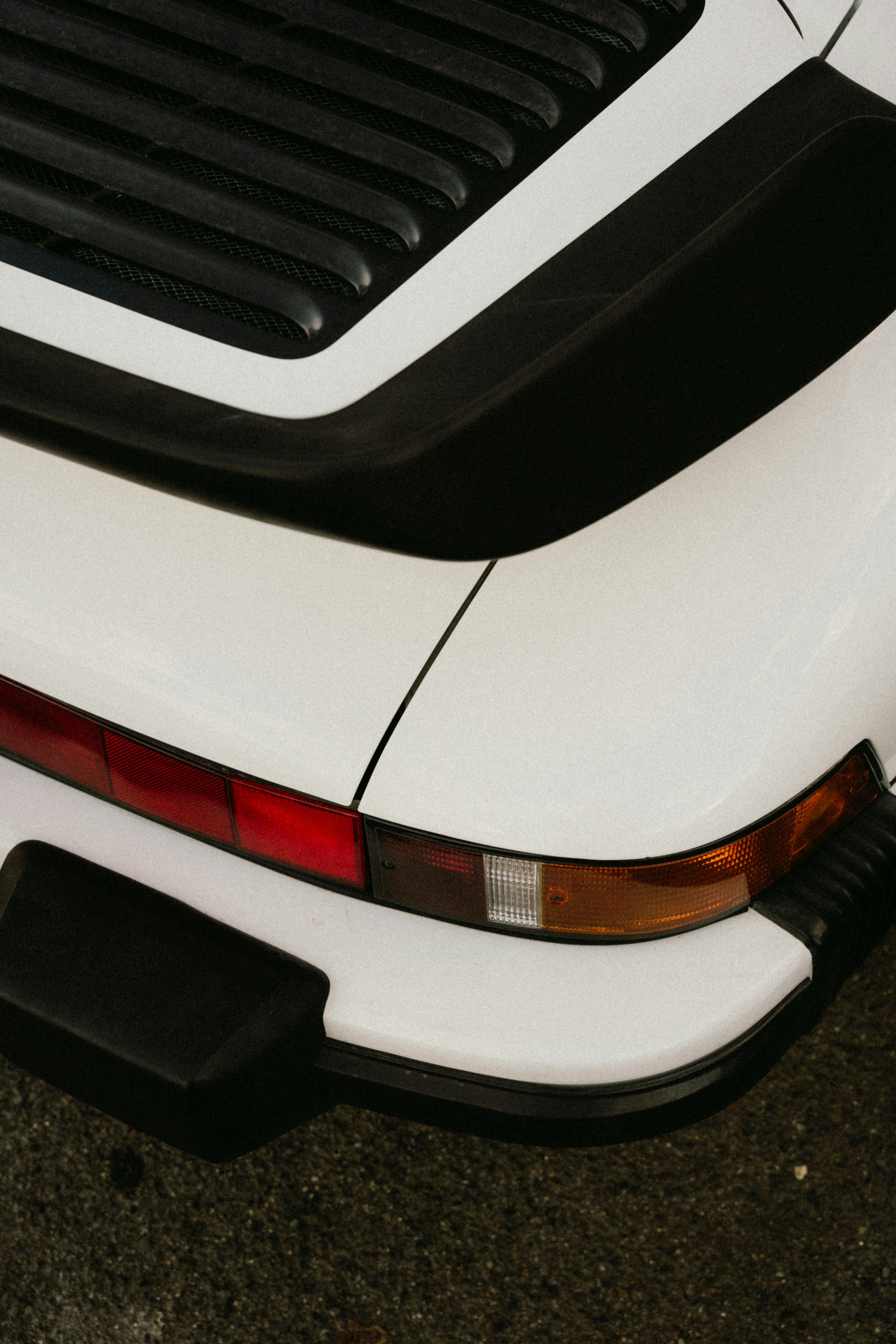 Classic White Car with Retro Tail Light Design · Free Stock Photo