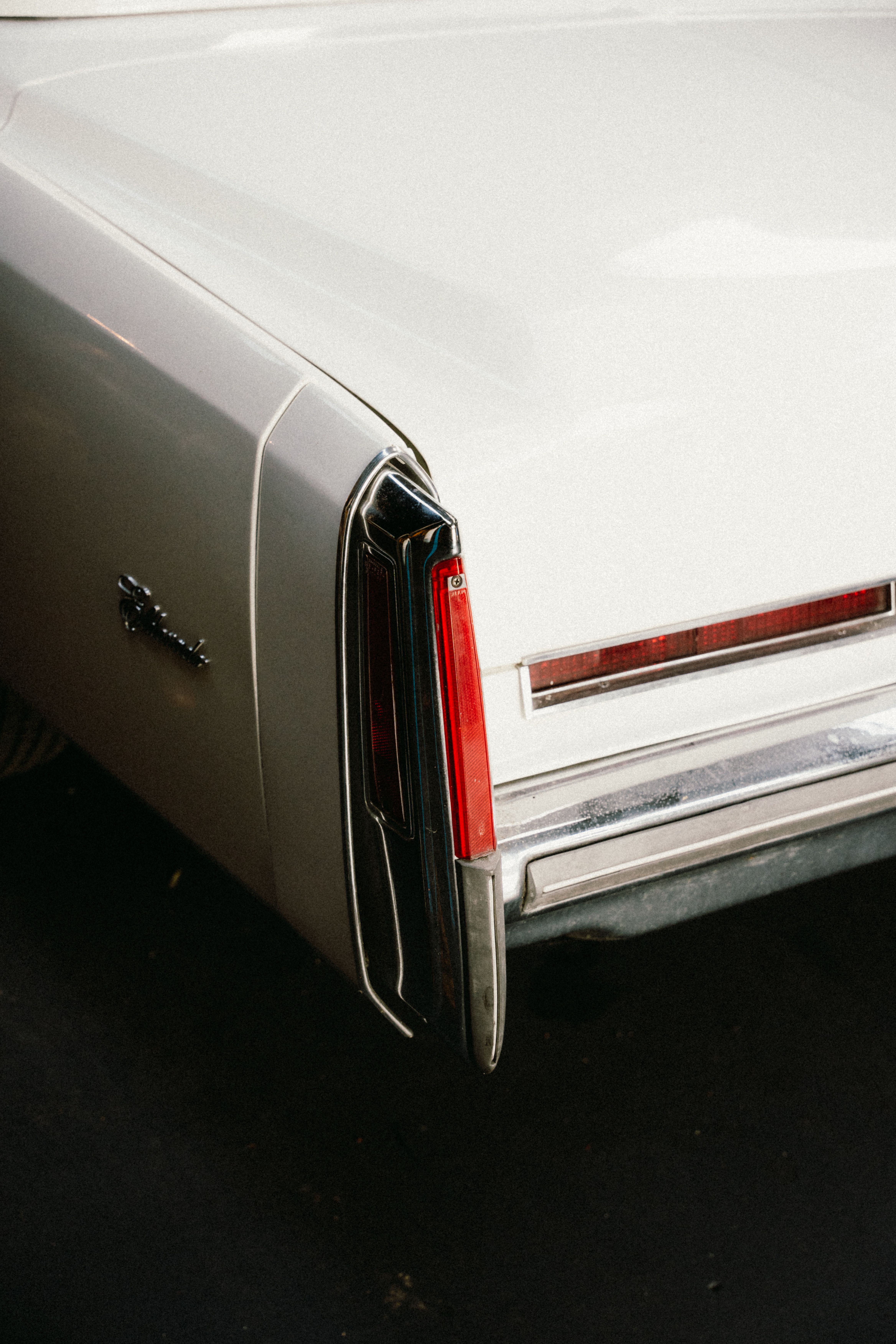 Vintage Classic Car Rear in Dim Light · Free Stock Photo