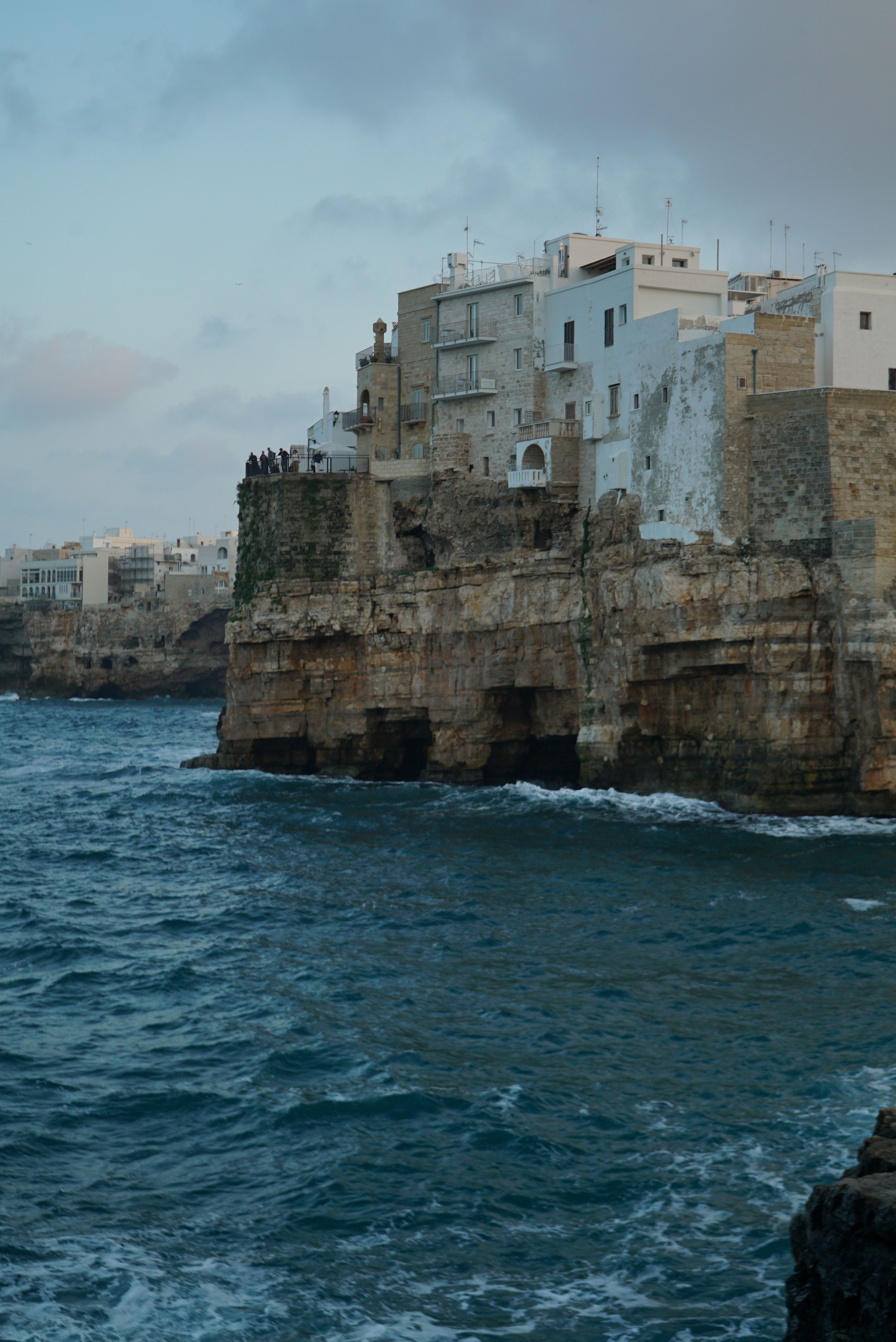 Scenic Cliffside Village Overlooking the Sea · Free Stock Photo