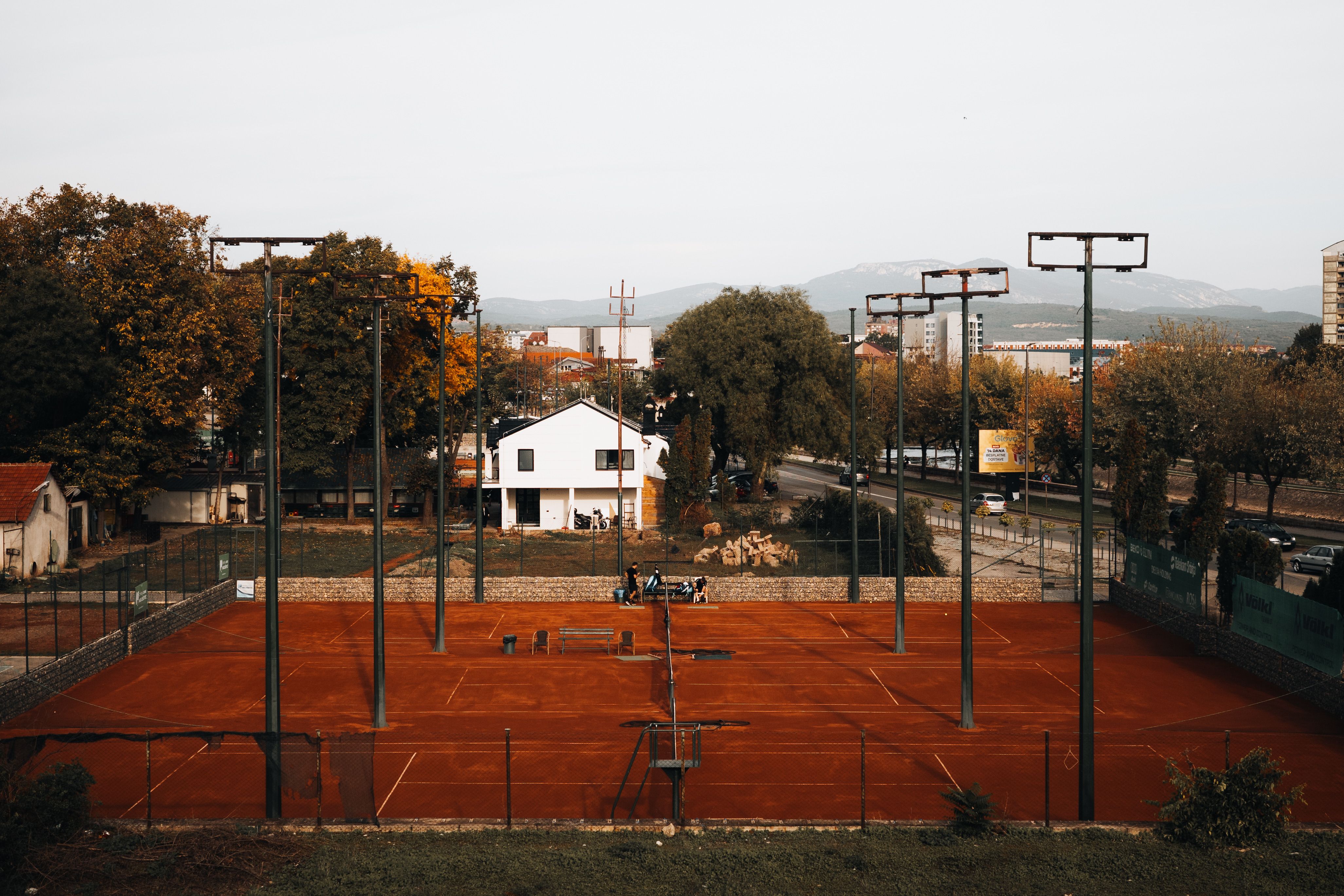 Aerial View of Autumn Tennis Court Scene · Free Stock Photo