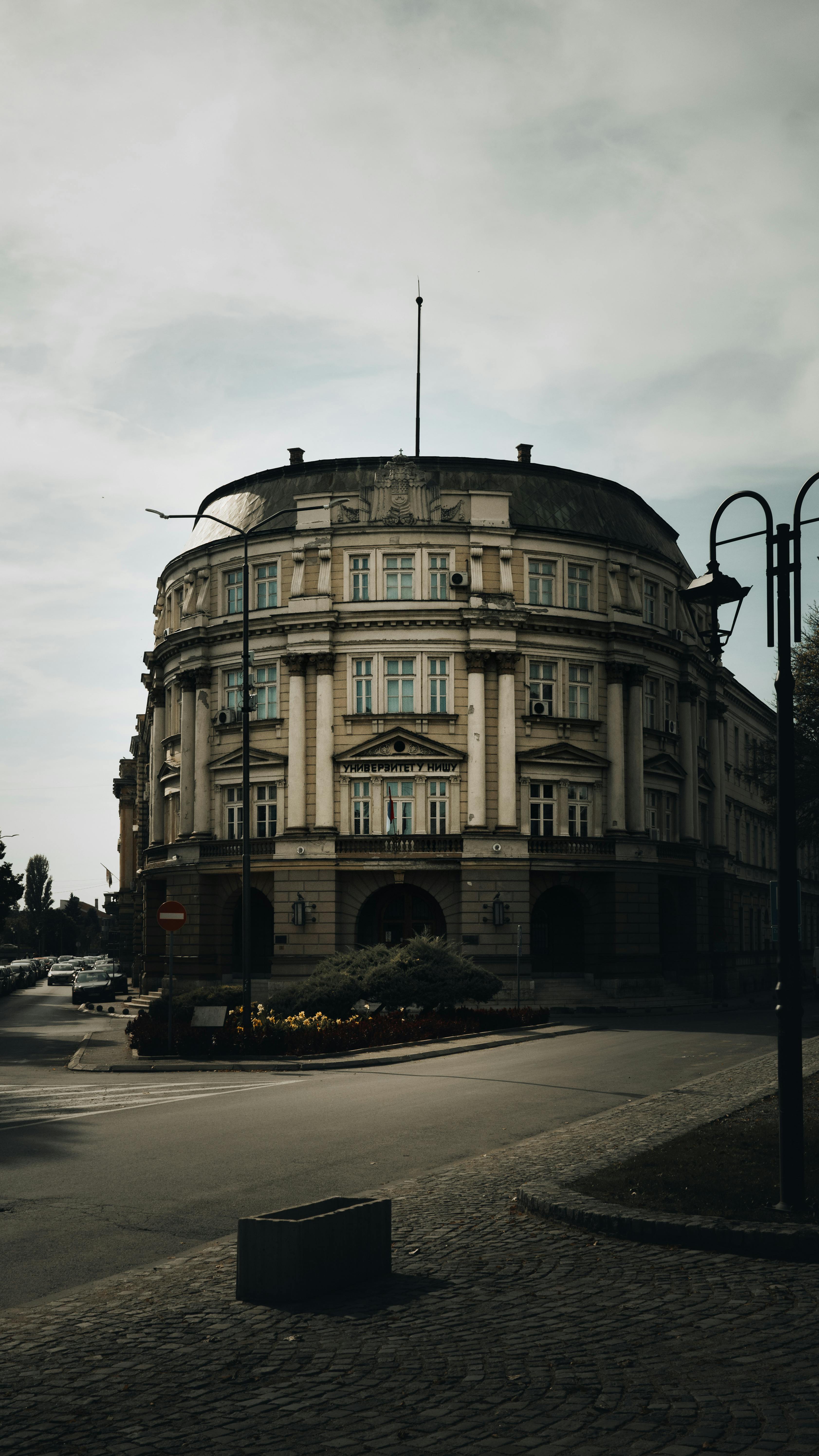 Historic European Building on a Street Corner · Free Stock Photo