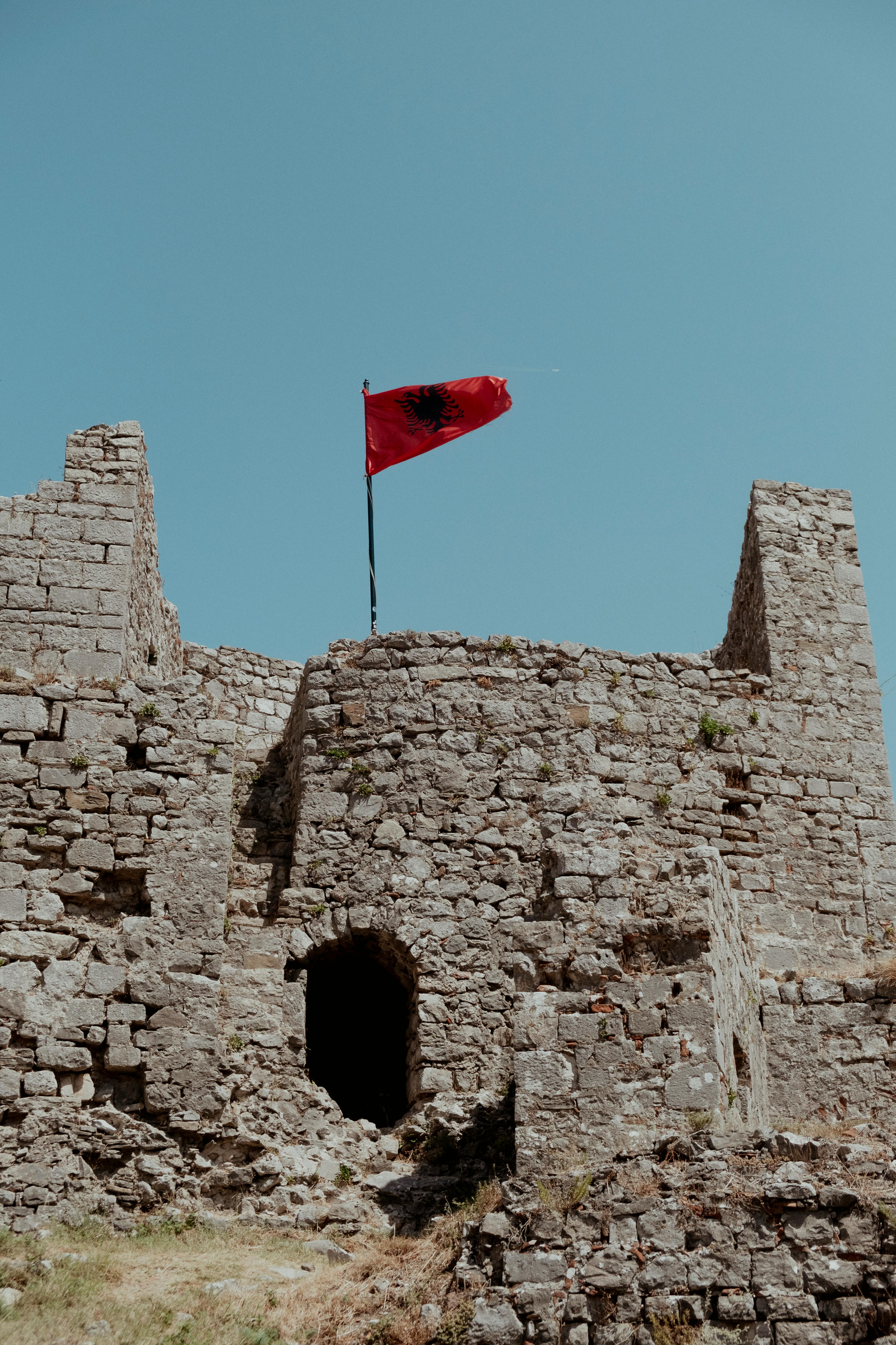 Historic Shkodër Castle with Albanian Flag · Free Stock Photo