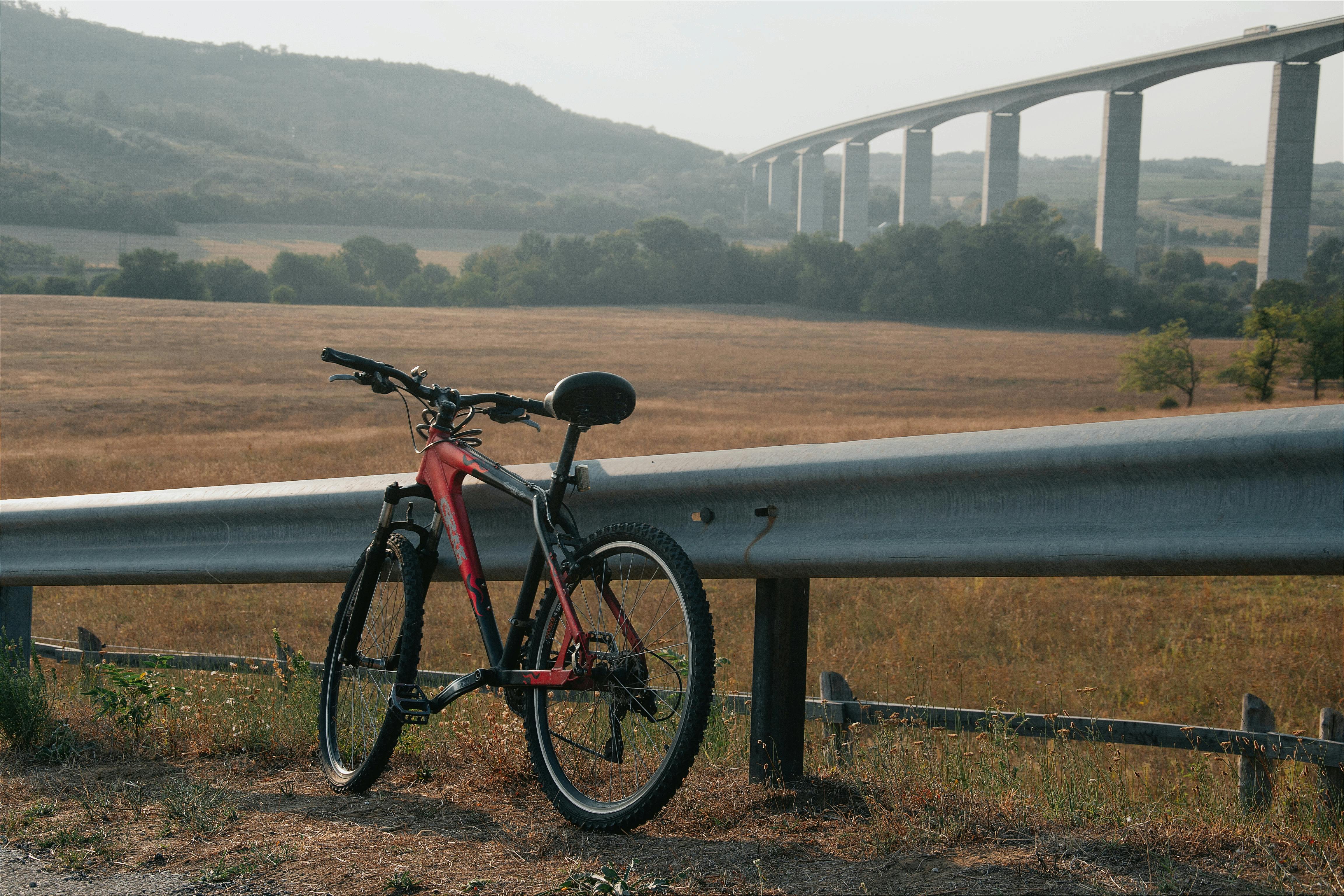 Scenic Bicycle Stop by Hungarian Bridge Landscape · Free Stock Photo