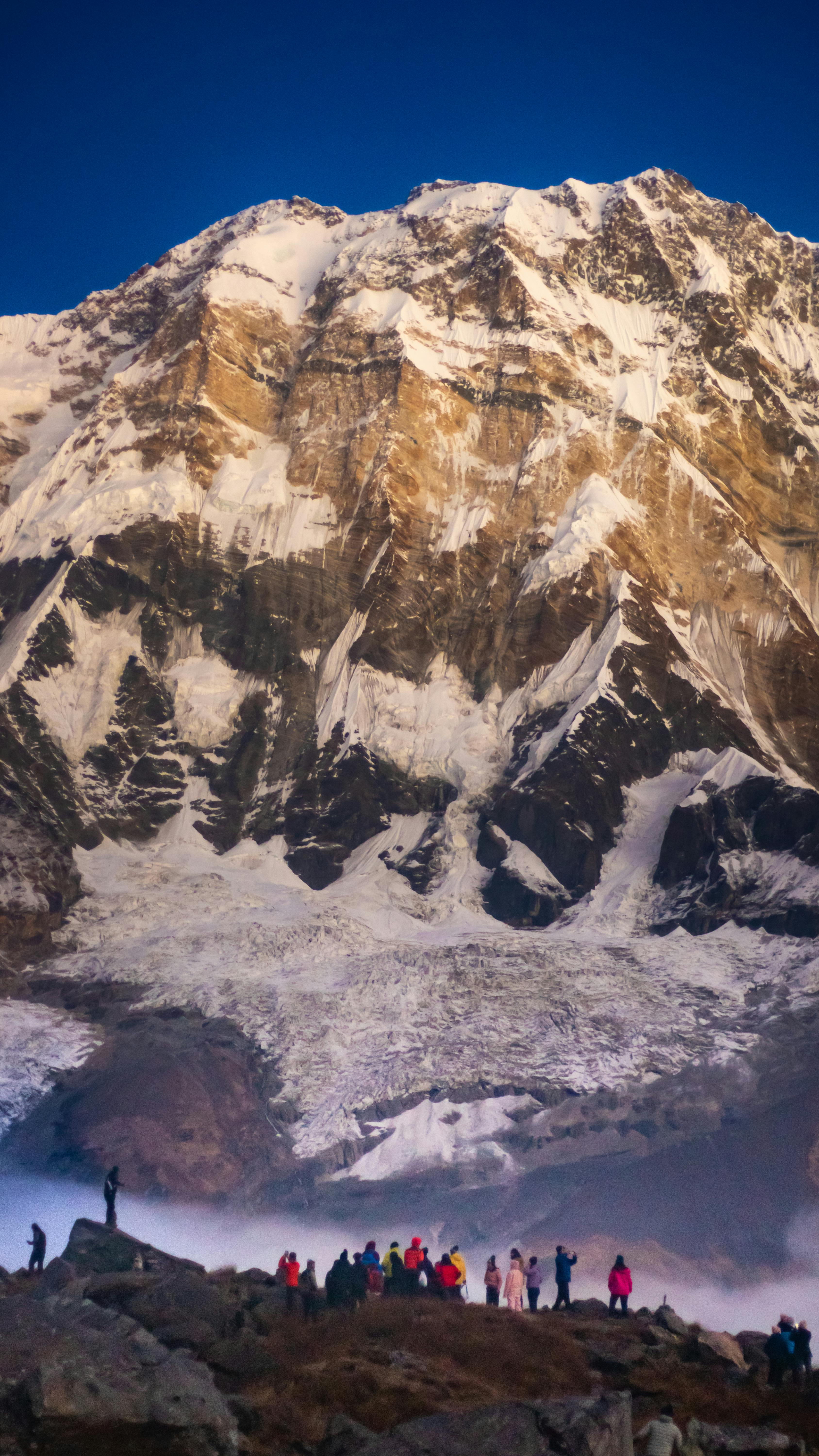 Hikers Gather at Annapurna Base Camp · Free Stock Photo