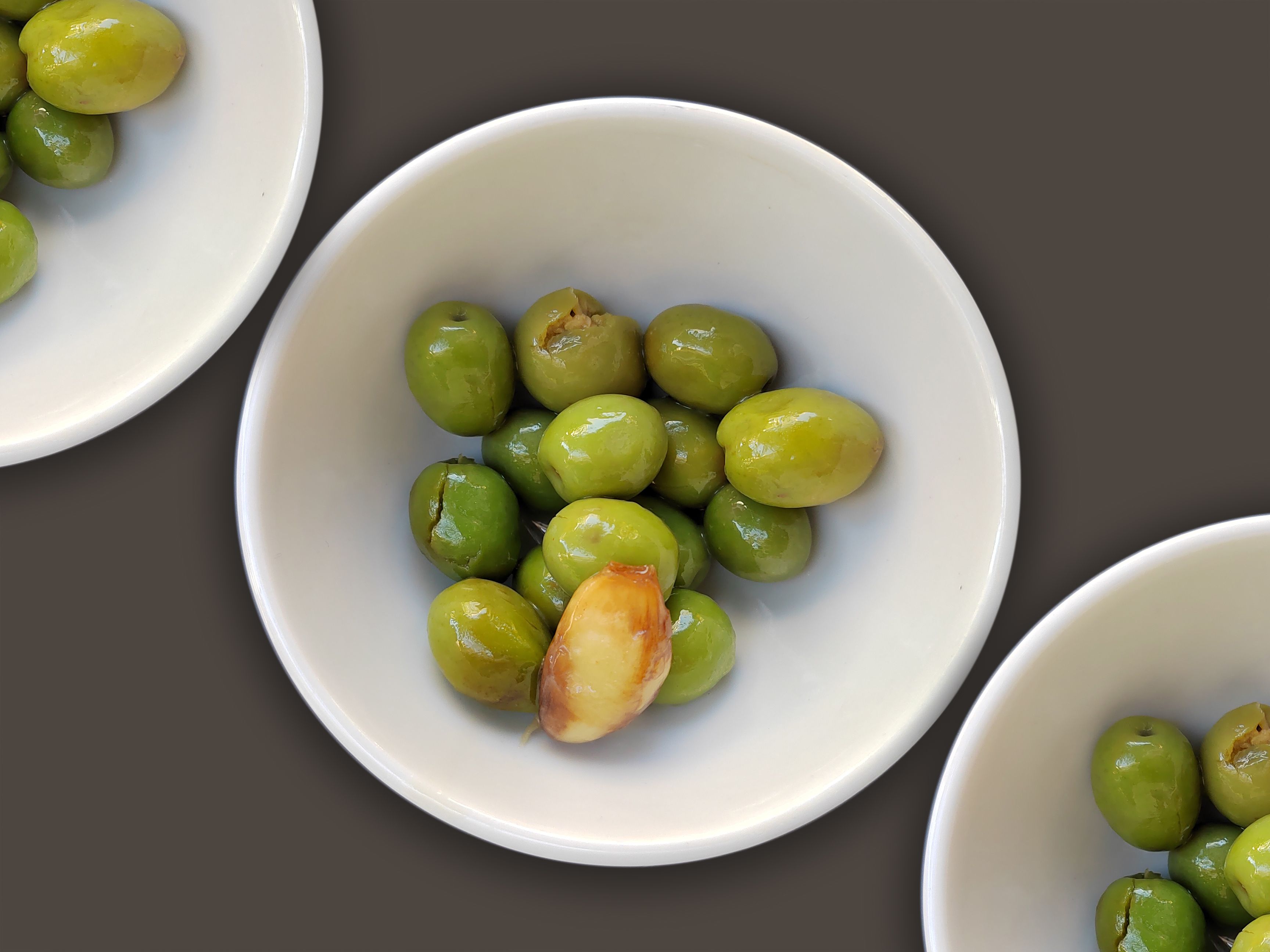 Spanish Green Olives with Garlic in Bowls · Free Stock Photo
