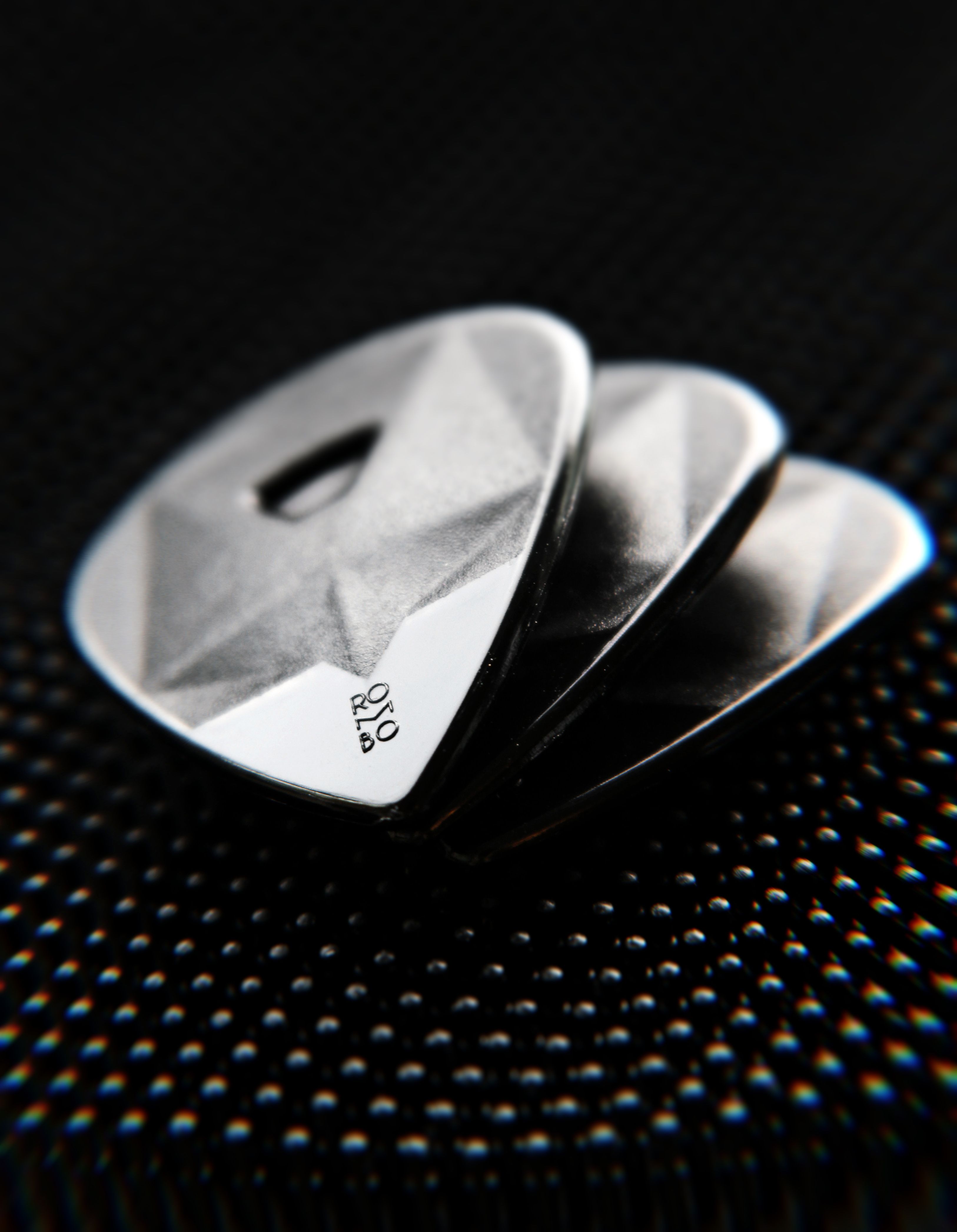 Close-up of Geometric Patterned Guitar Picks · Free Stock Photo