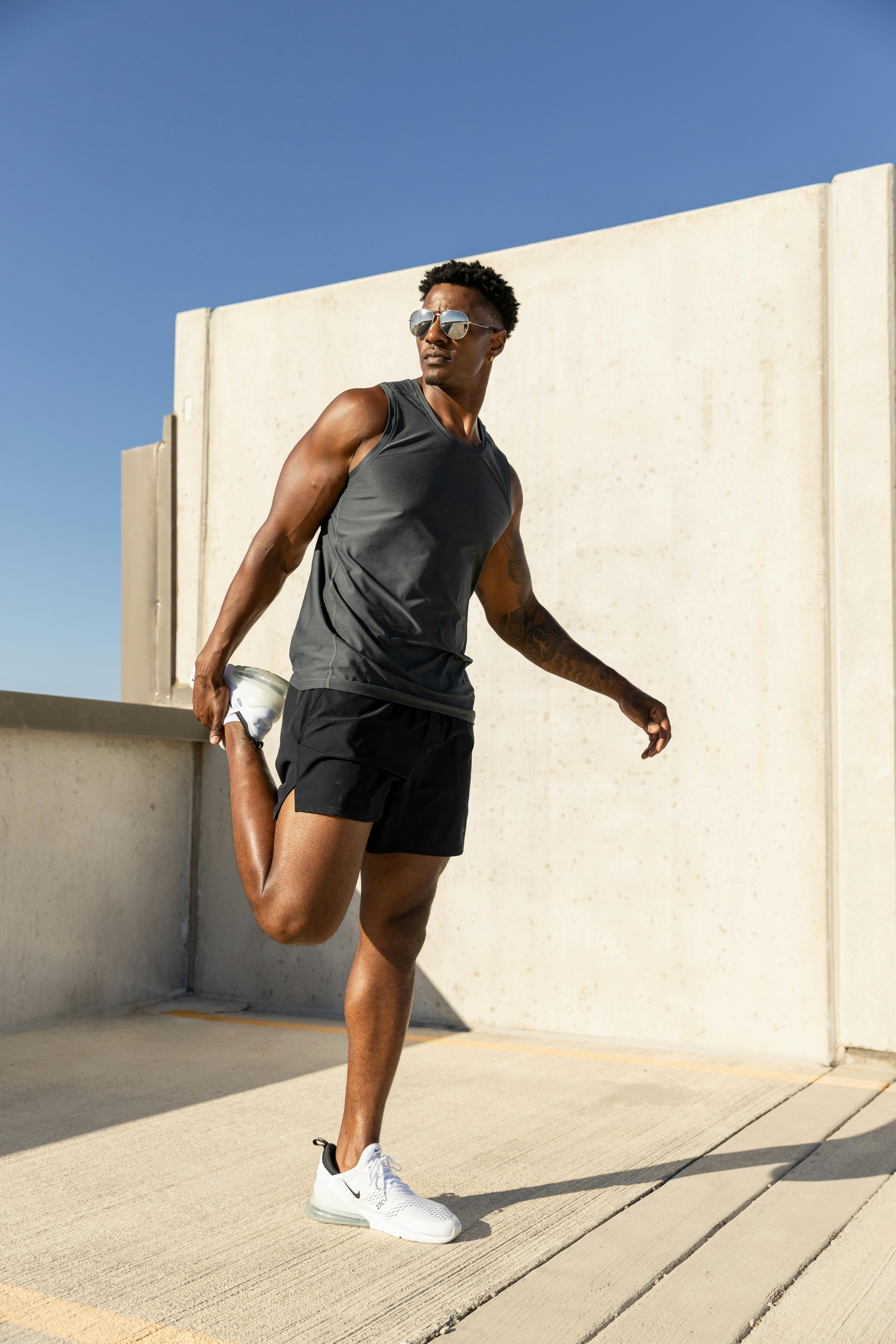 Athleisure Fitness Photoshoot on Rooftop · Free Stock Photo
