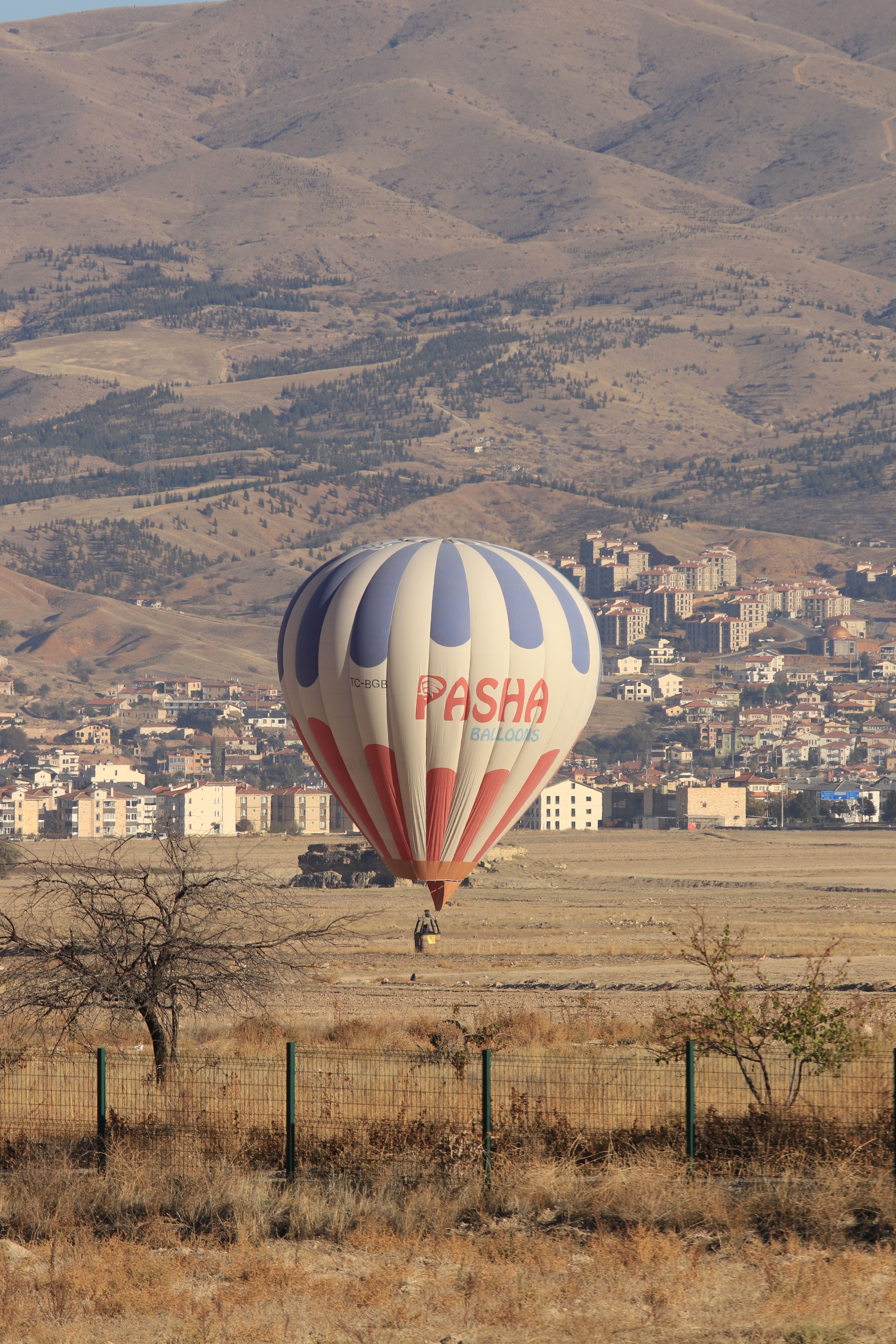 Hot Air Balloon over Cappadocia Landscape · Free Stock Photo