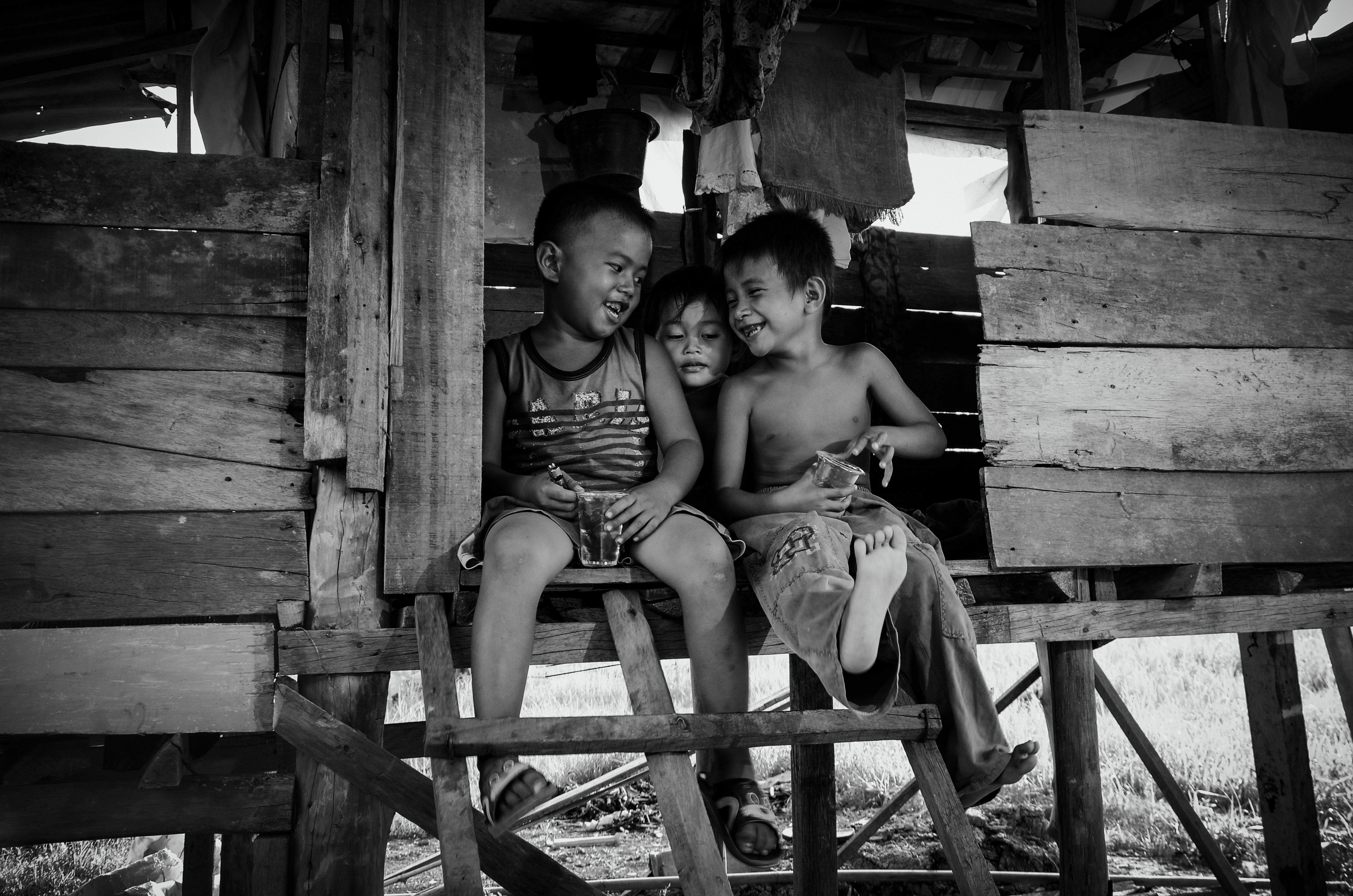 Smiling Indonesian Children Playing Outdoors · Free Stock Photo