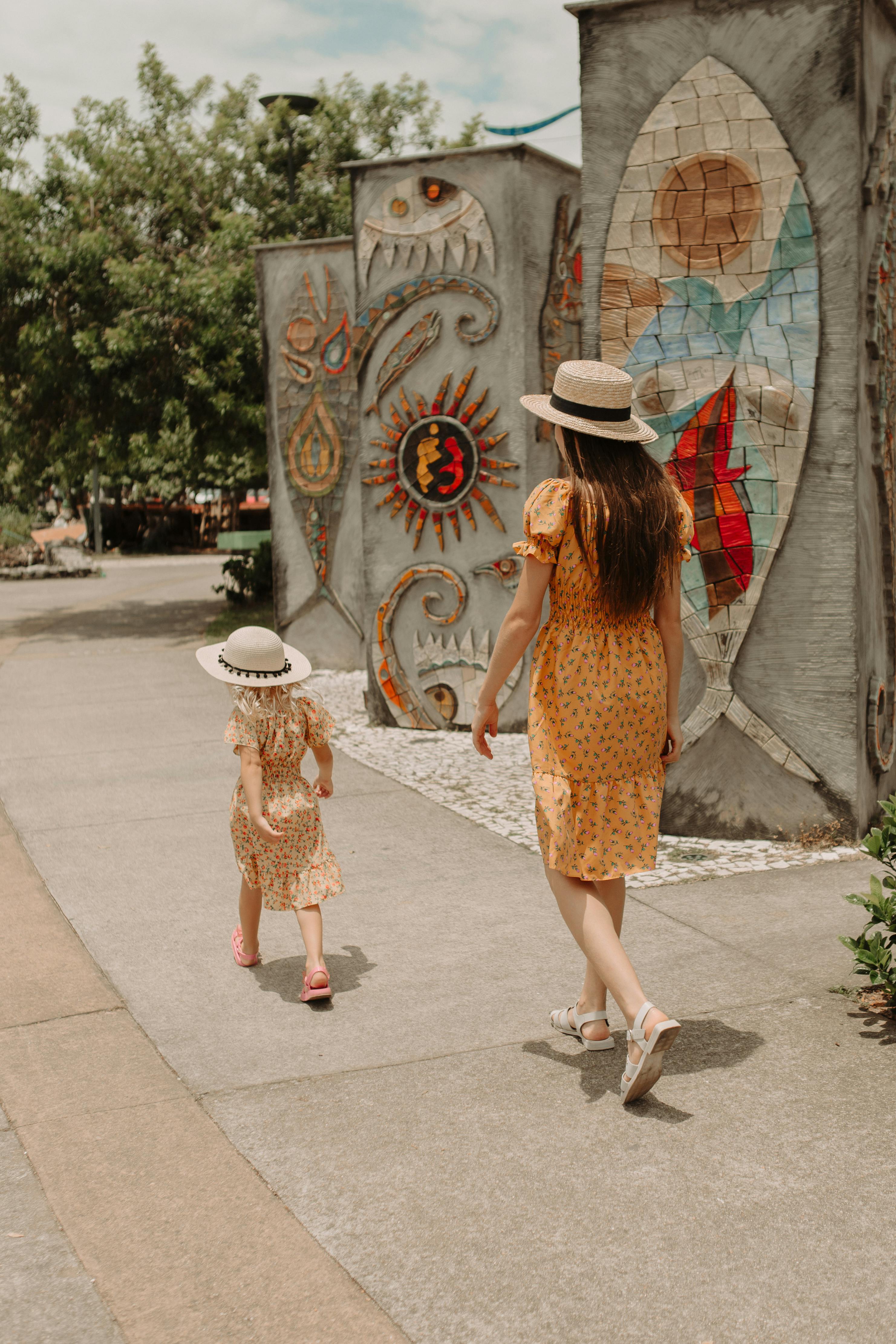Mother and Daughter Exploring Artistic Street Murals · Free Stock Photo