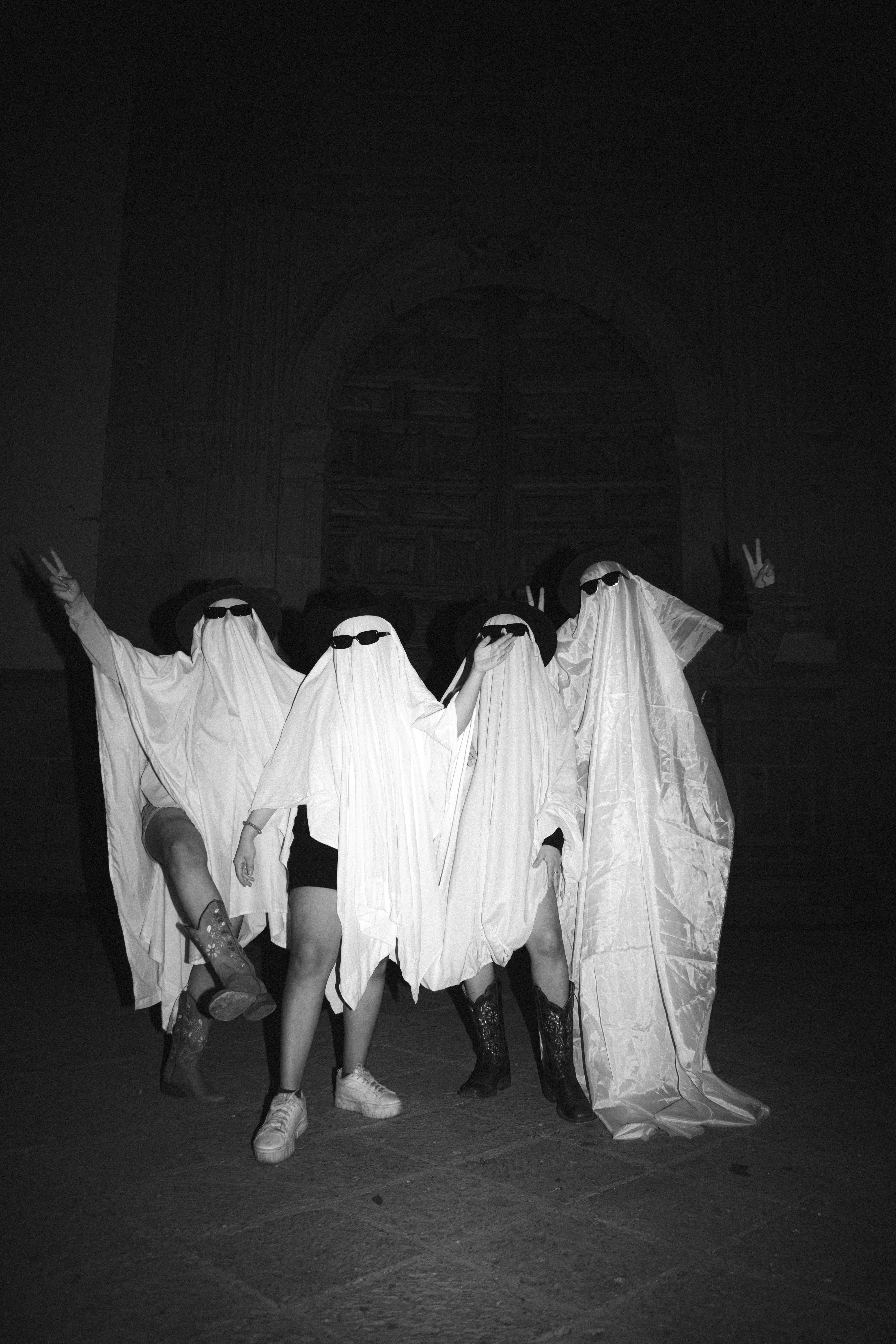 Group of People in Creative Ghost Costumes at Night · Free Stock Photo
