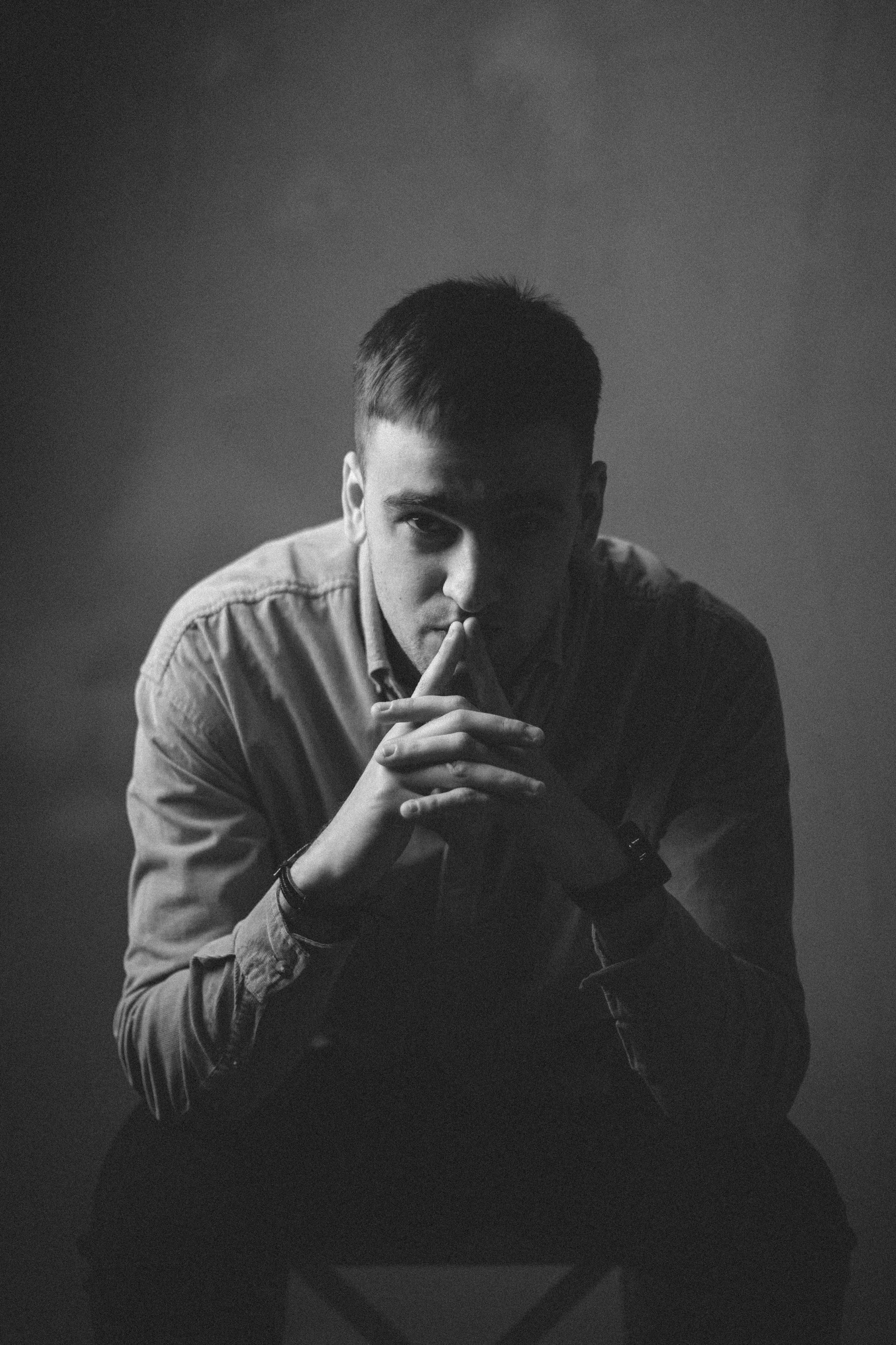 Moody Black and White Male Portrait in Studio · Free Stock Photo