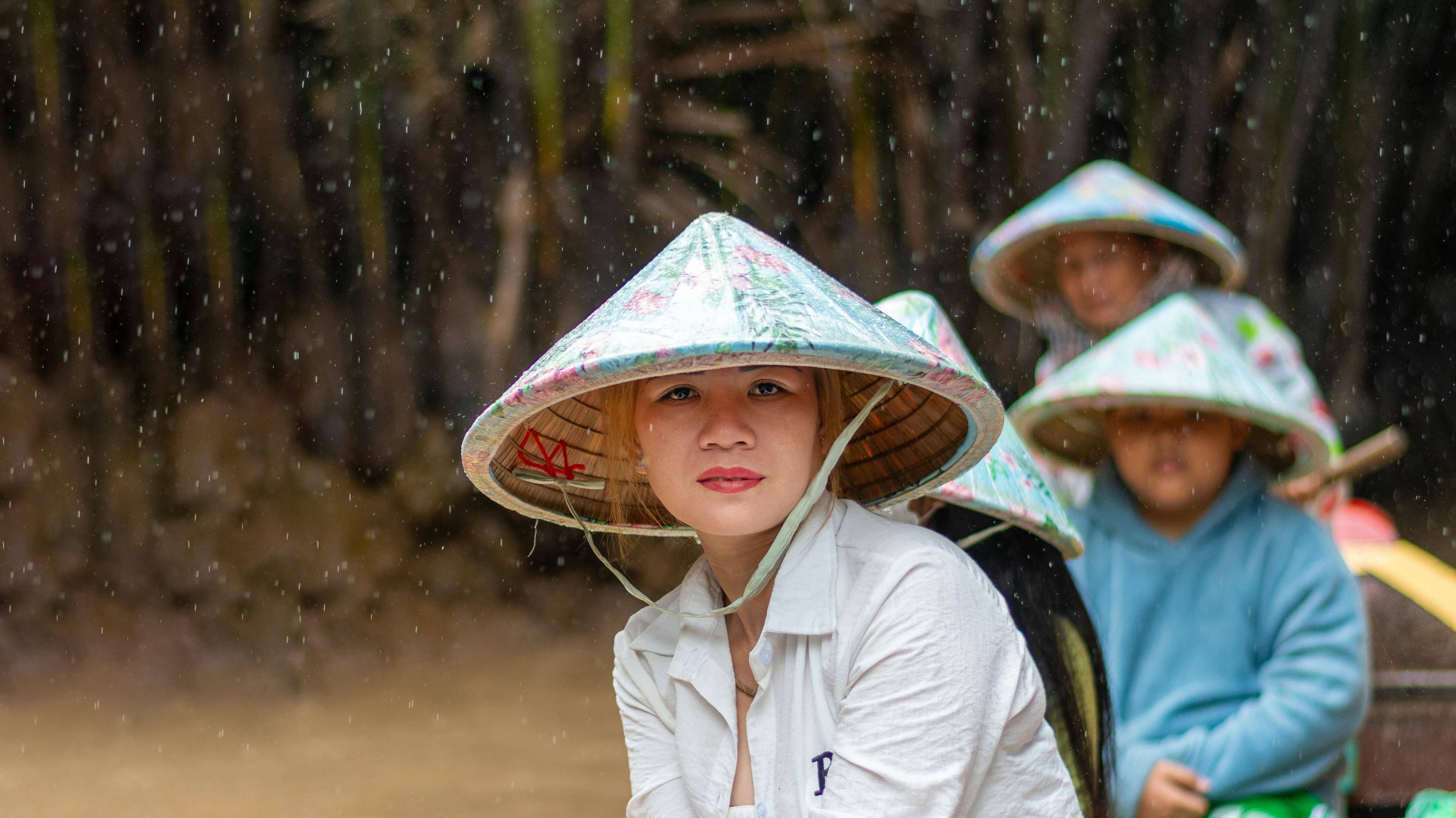 Traditional Vietnamese Boat Ride in Mỹ Tho Rain · Free Stock Photo