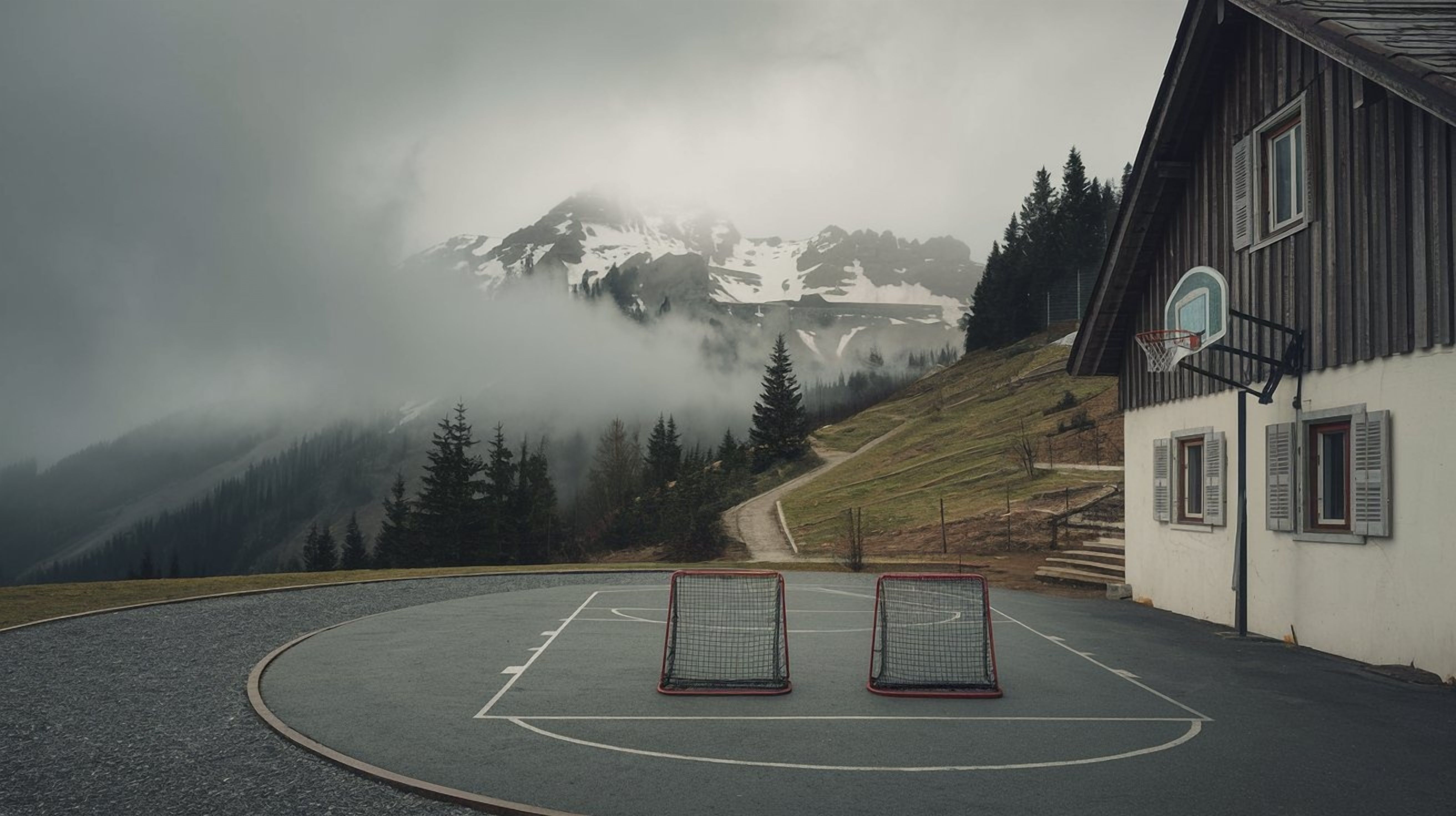 Misty Mountain Basketball Court in Foggy Landscape · Free Stock Photo