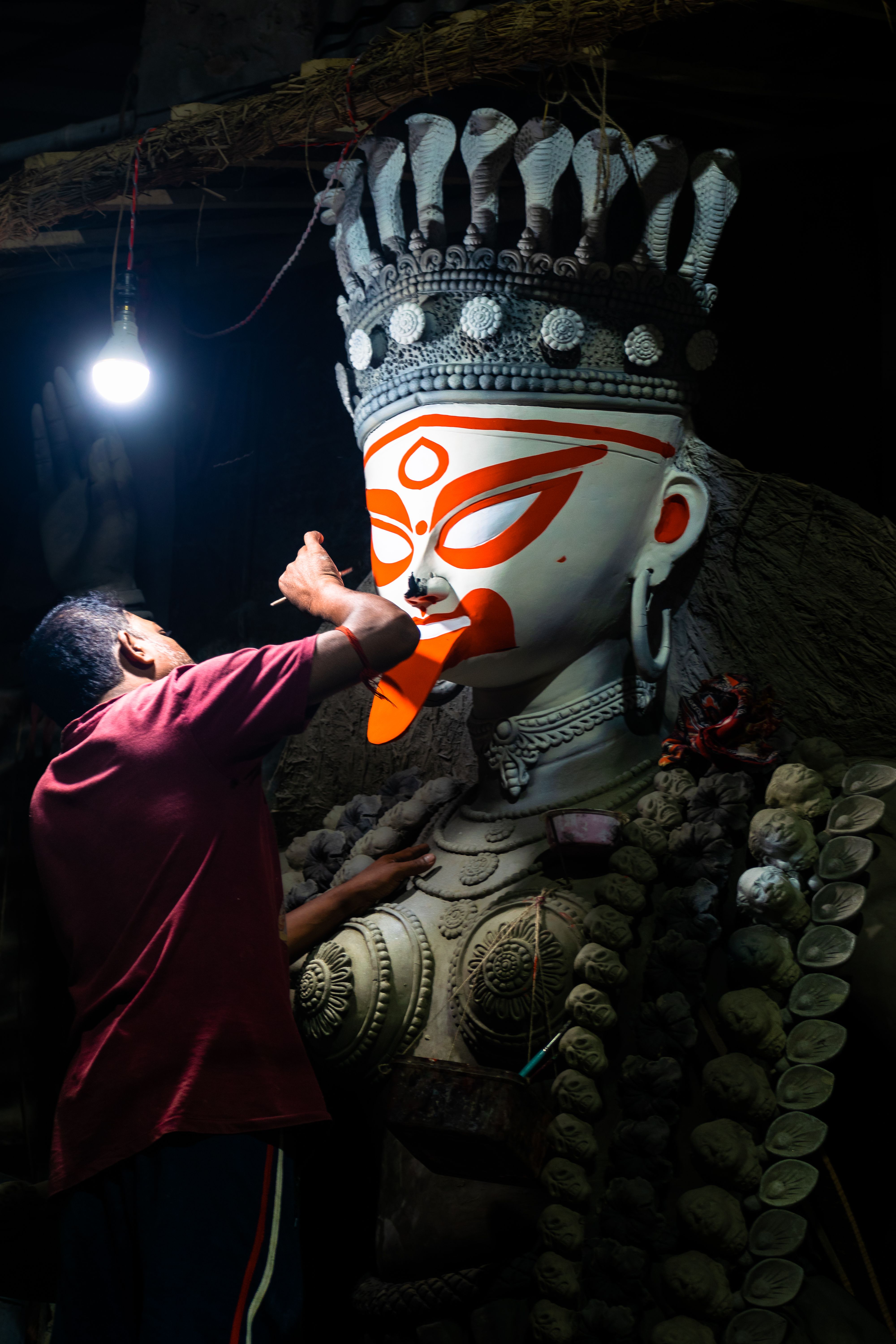 Artist Painting Goddess Kali Idol in Kolkata Workshop · Free Stock Photo