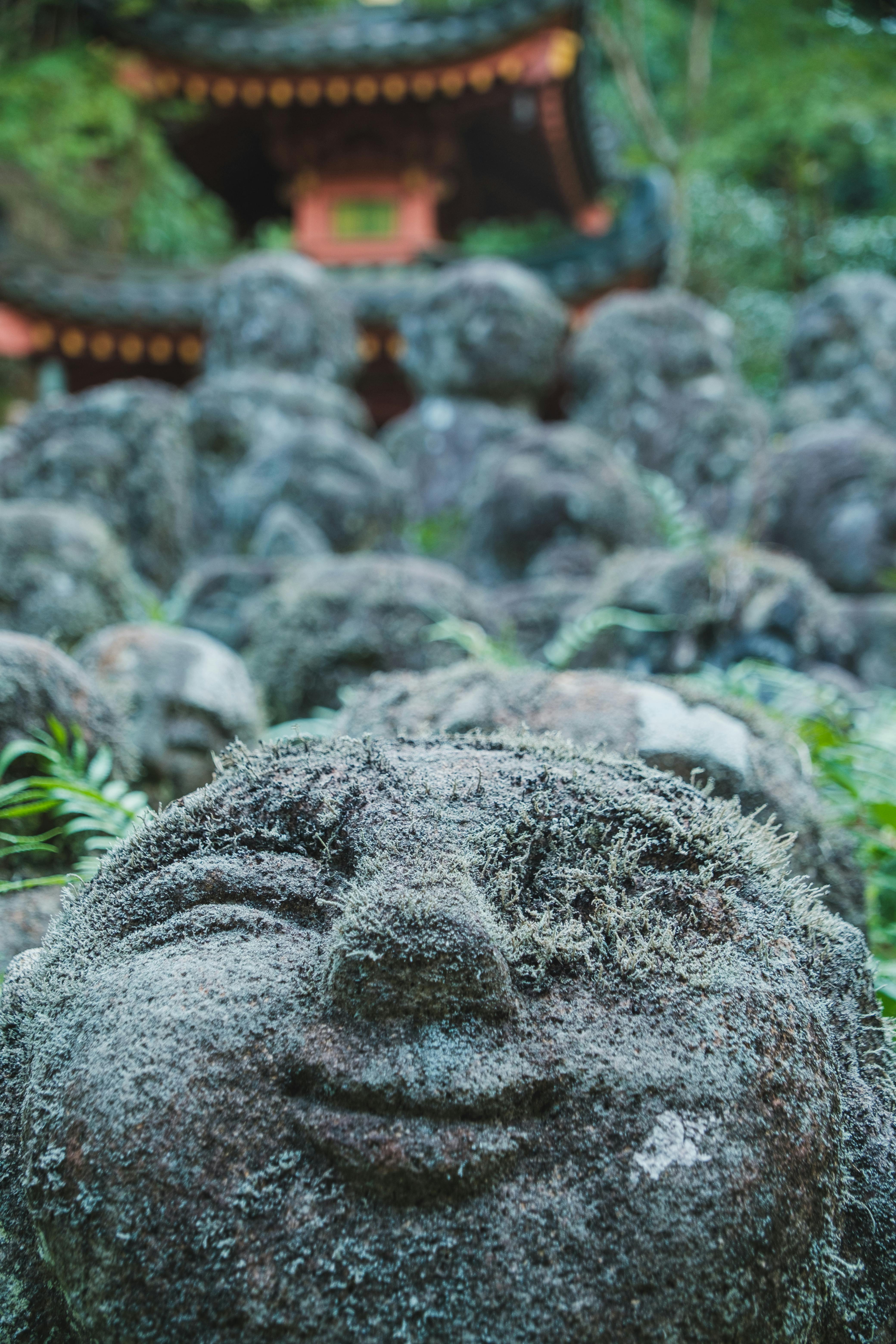Moss-Covered Stone Statues in Japanese Garden · Free Stock Photo