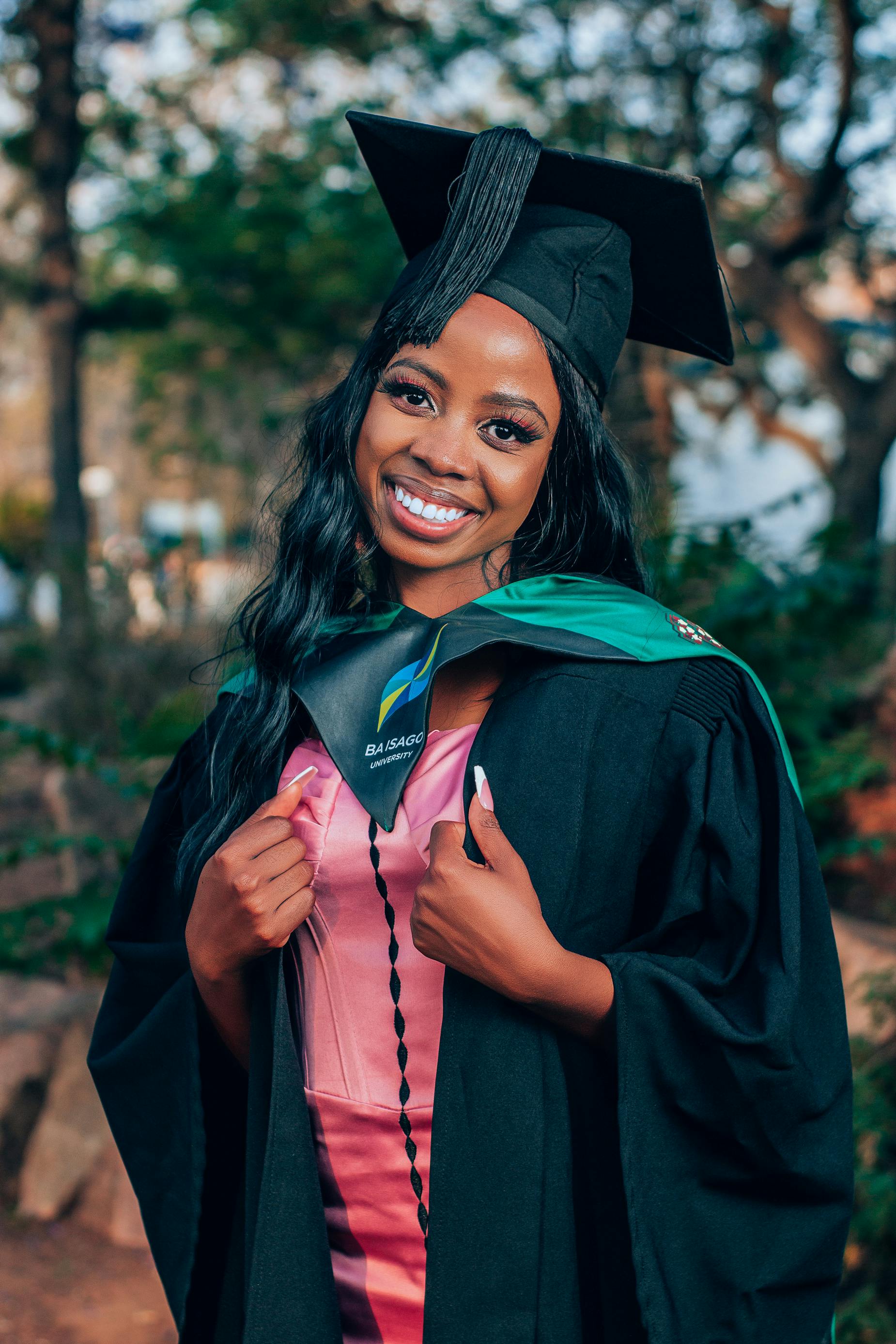 Proud African Female Graduate Celebrating Outdoors · Free Stock Photo